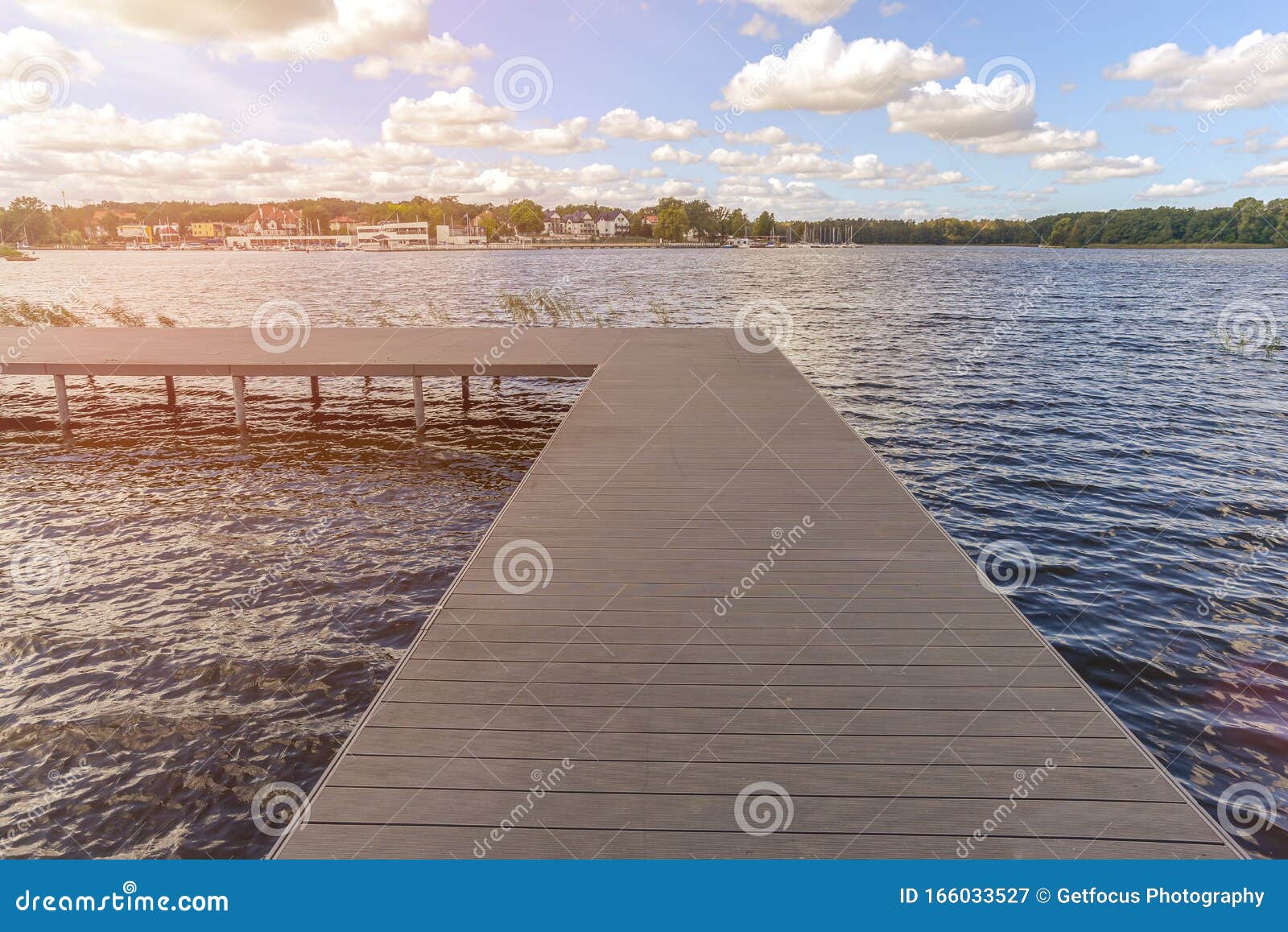 Empty dock in calm lake stock image. Image of berth - 166033527