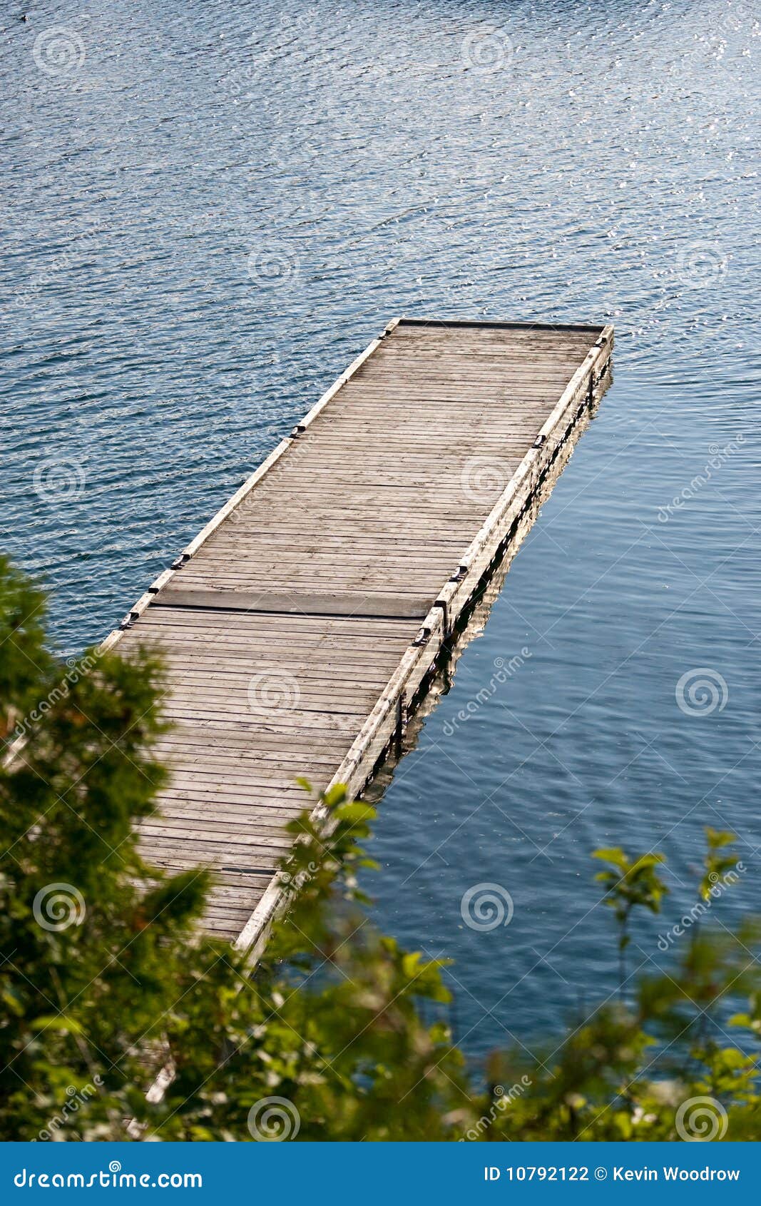 An Empty Dock Extending into the Water Stock Photo - Image of green ...