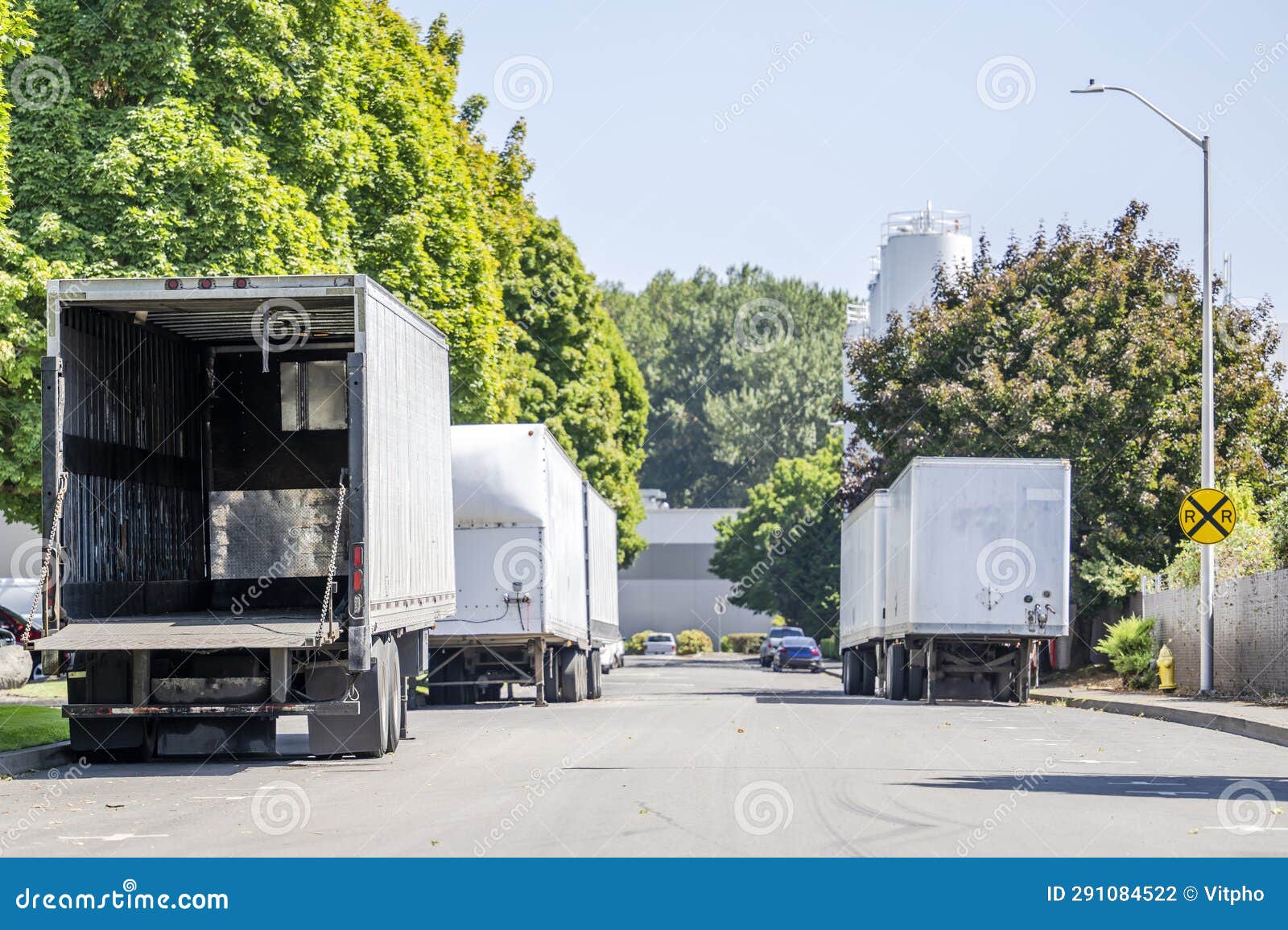 Empty Dry Van Semi Trailers with Open Back Door Standing on the Street ...