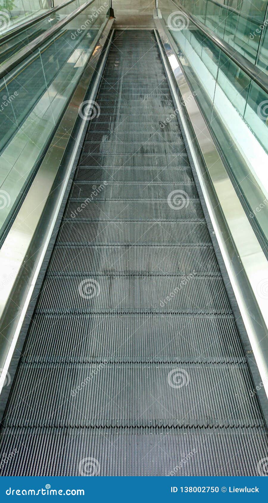 An Escalator Is A Moving Staircase Which Carries People Between Floors ...