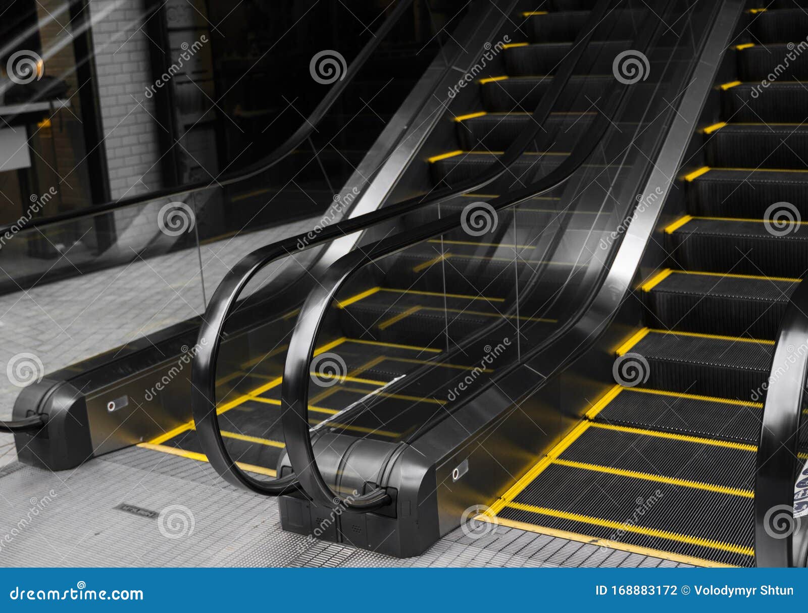 Empty Escalators Stairway with a Yellow Stripes. Stock Photo - Image of ...