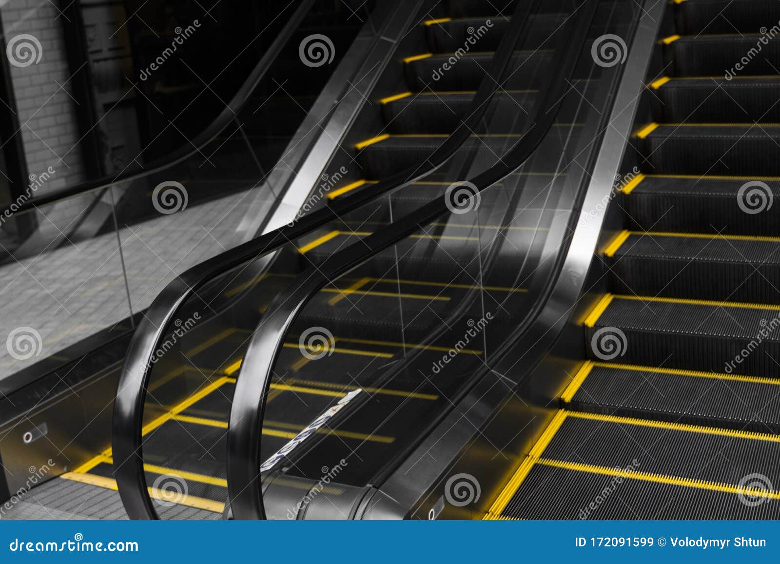 Empty Escalators Stairway with a Yellow Stripes. Stock Image - Image of ...
