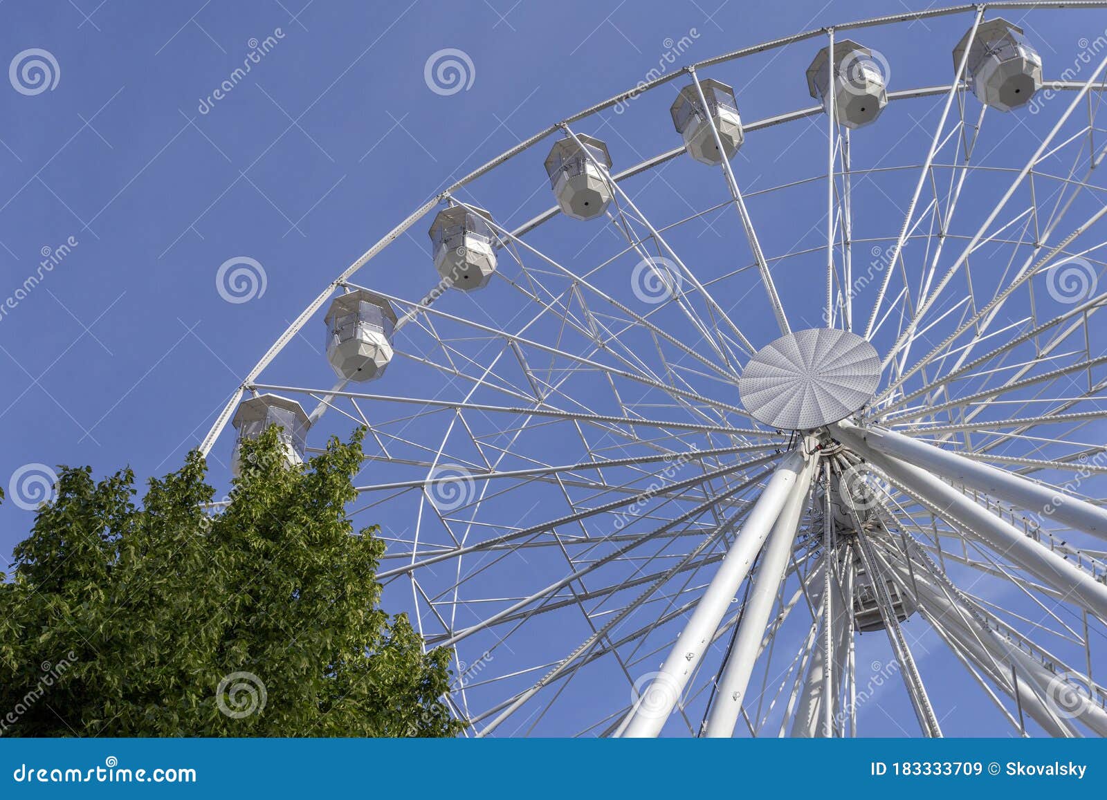 Empty Ferris Wheel with a Blue Sky in the Background Stock Image ...