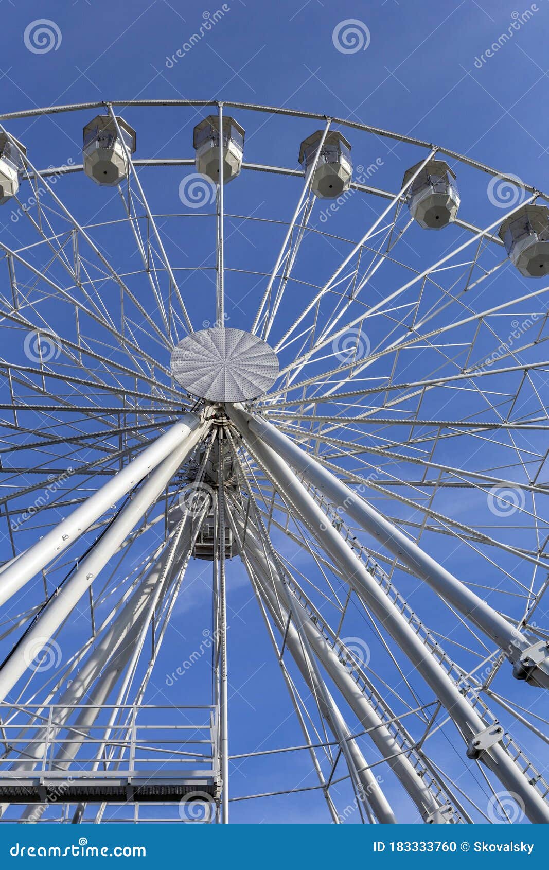 Empty Ferris Wheel with a Blue Sky in the Background Stock Photo ...