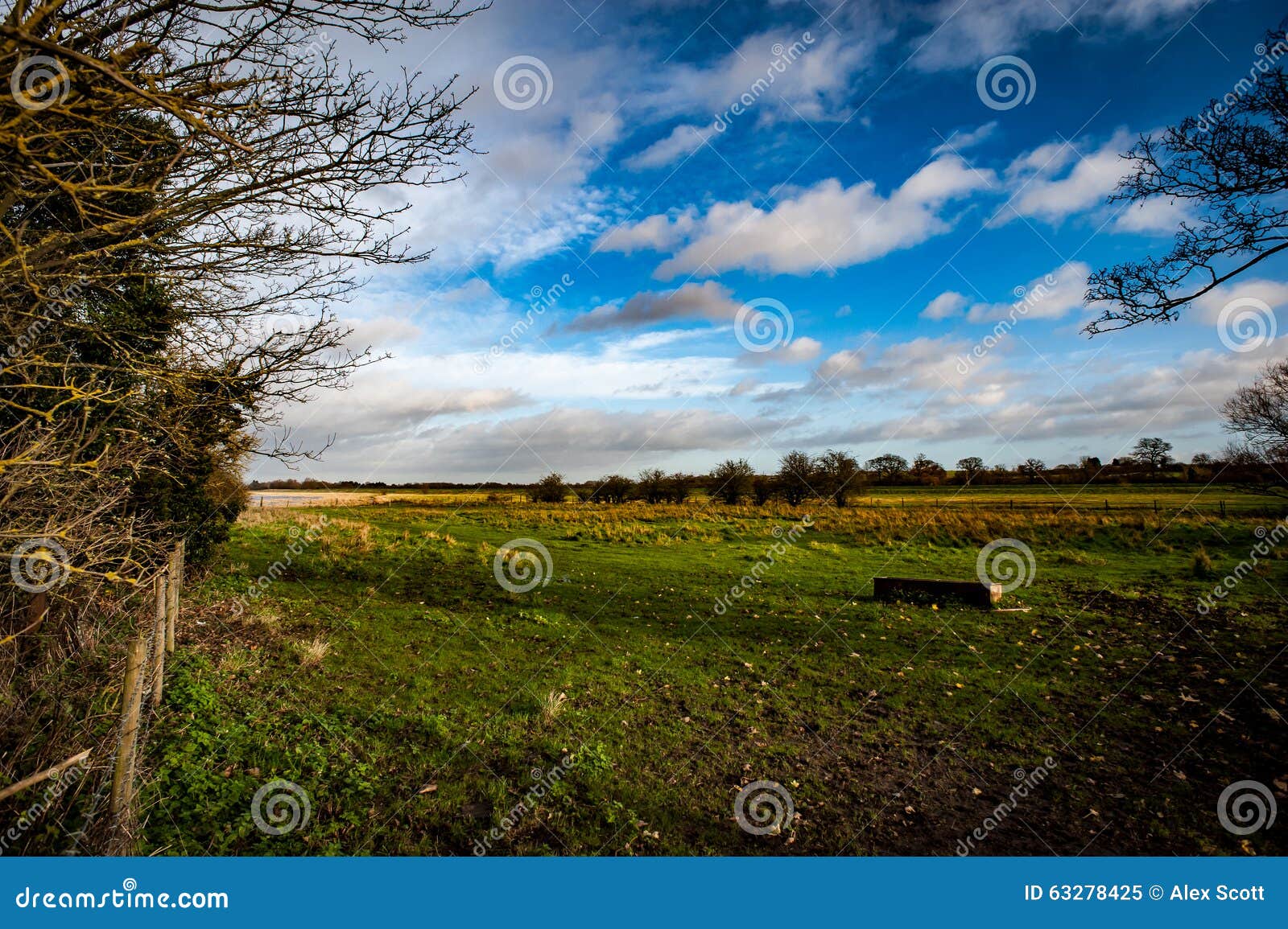 Empty field and stormy sky stock image. Image of trough - 63278425
