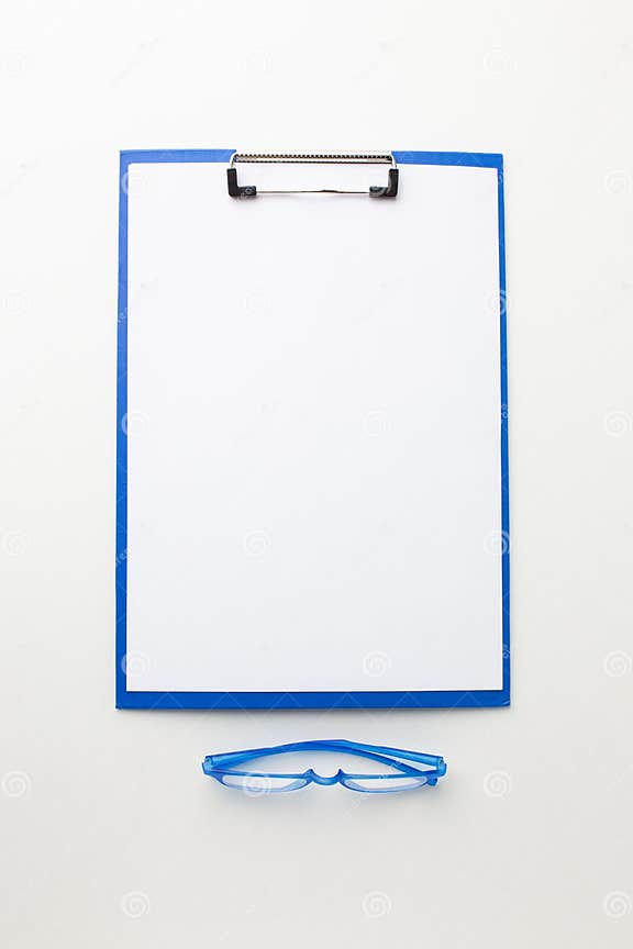Empty File Folder on White Desk with Glasses for Sight. Top View Stock ...