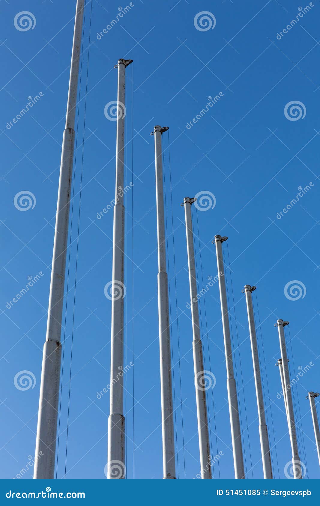 Empty flagpoles stock image. Image of series, mast, flagpole - 51451085