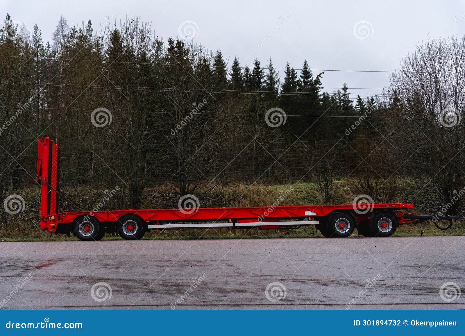 Empty Flatbed Trailer Parked on the Parking Lot Stock Photo - Image of ...