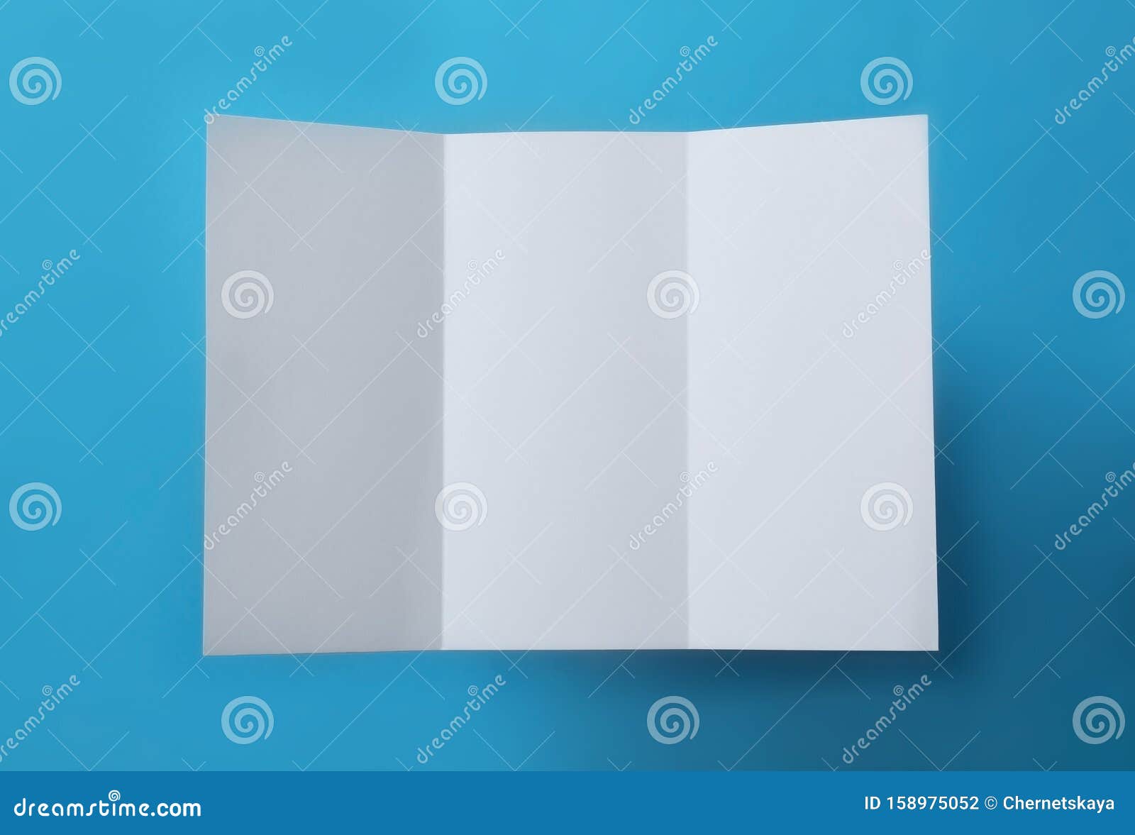 Empty Flyer on Blue Background. Mockup for Design Stock Photo - Image ...