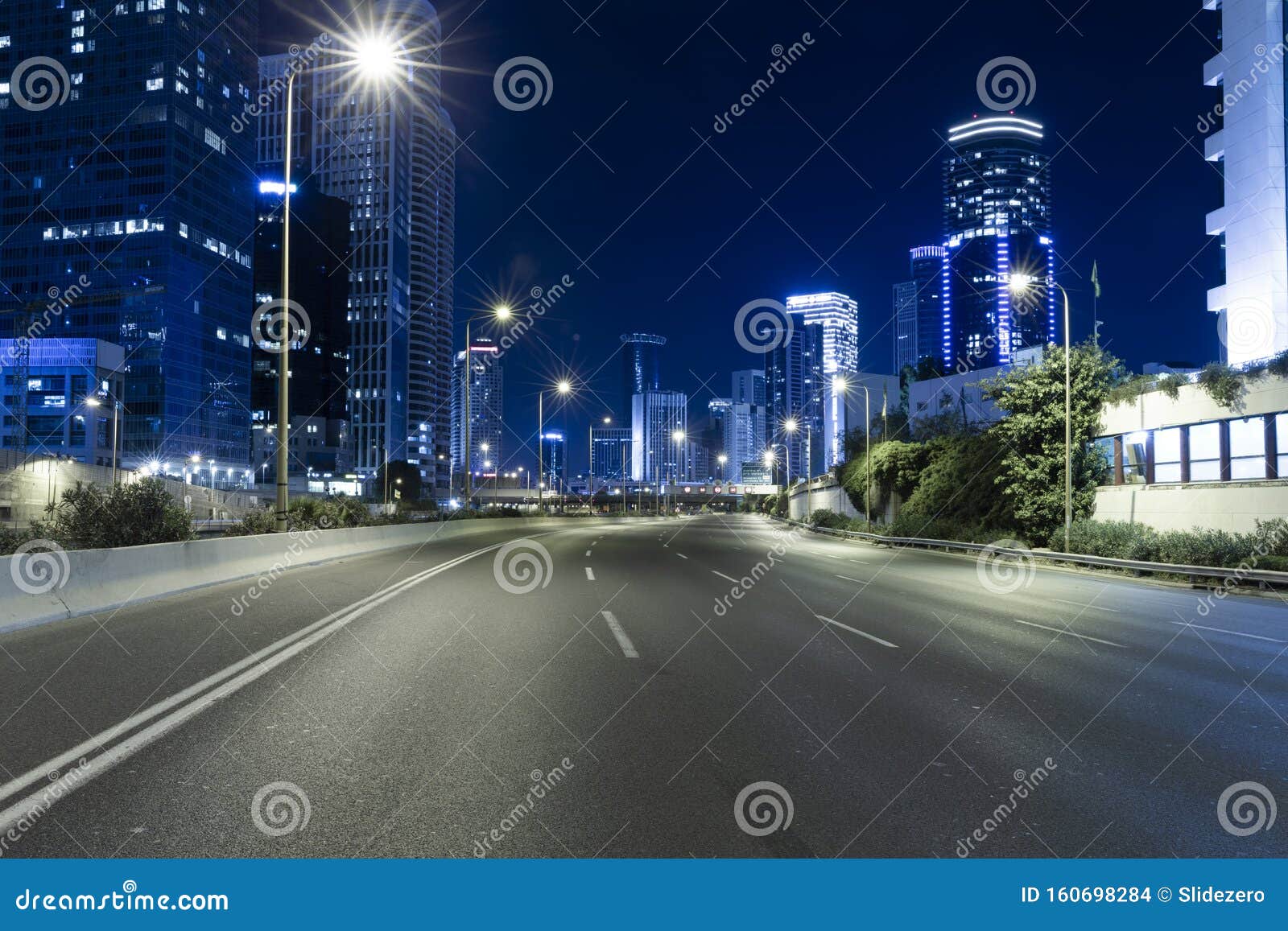 Empty Freeway at Night and Tel Aviv Skyline in Background Stock Photo ...