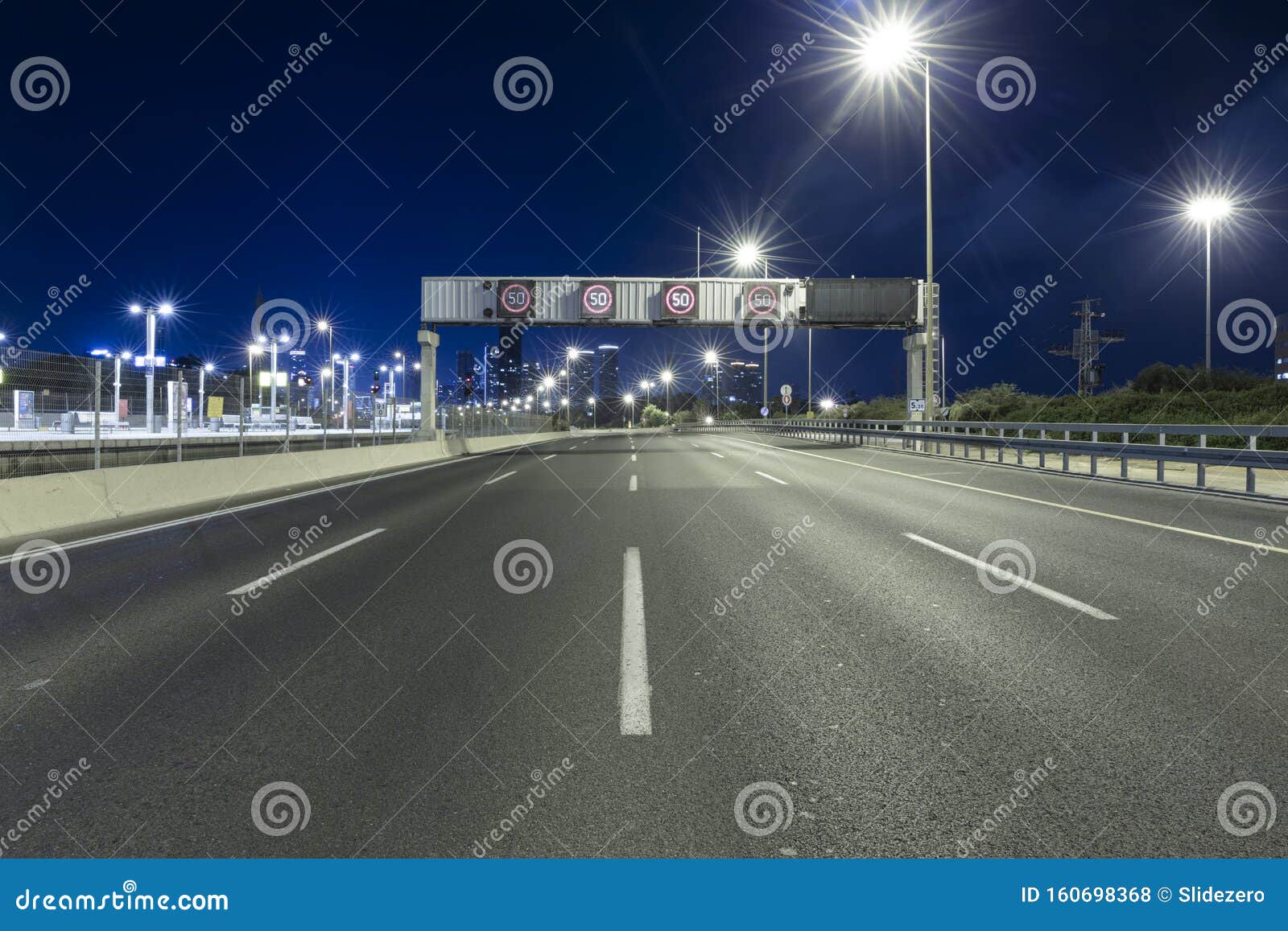Empty Freeway at Night and Tel Aviv Skyline in Background Stock Photo ...