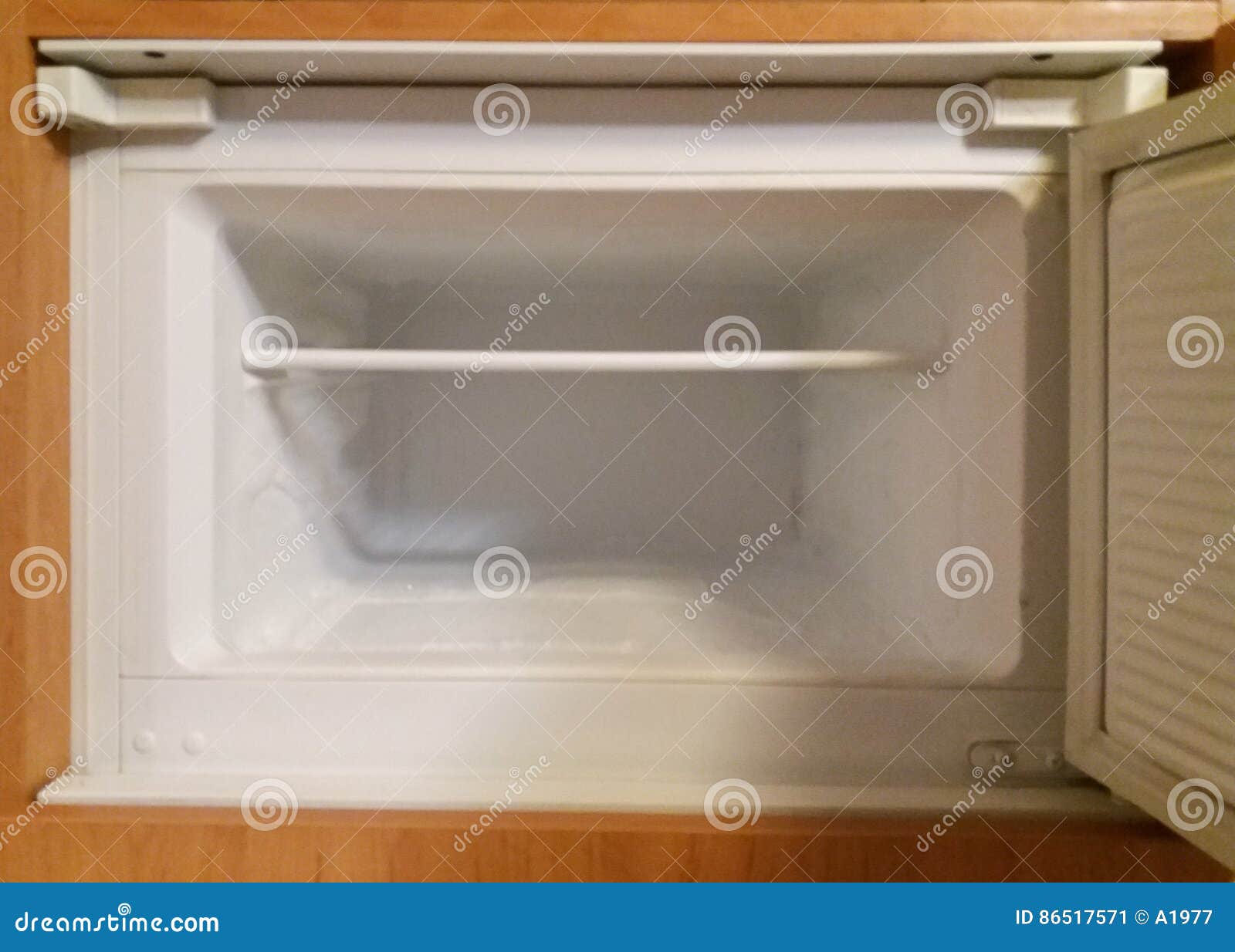 Empty Freezer Of A Refrigerator. Ice Buildup In The Inside Of A Freezer ...