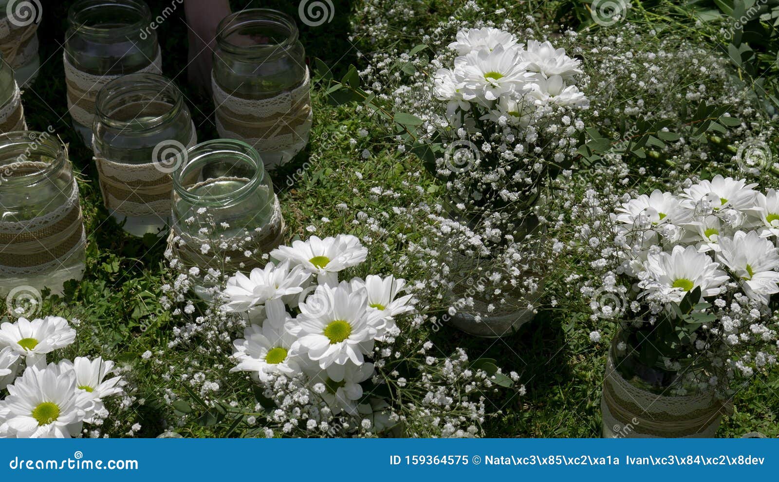 Empty and Full Jars with White Daisy Bouquets - Outside on the Green ...
