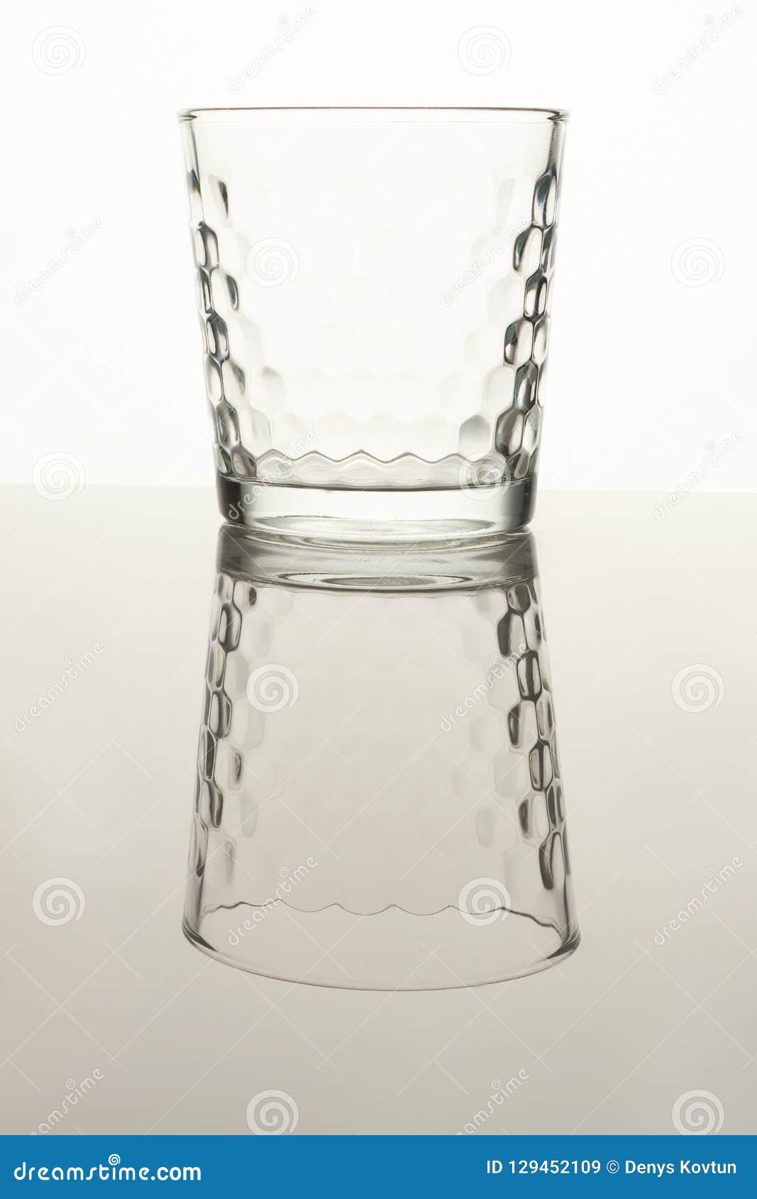 Empty full shot glass. stock image. Image of drinkglass - 129452109