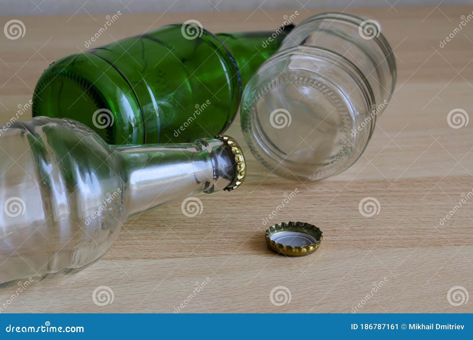 Empty Glass Beer Bottles and Beer Cork on the Table Stock Image - Image ...