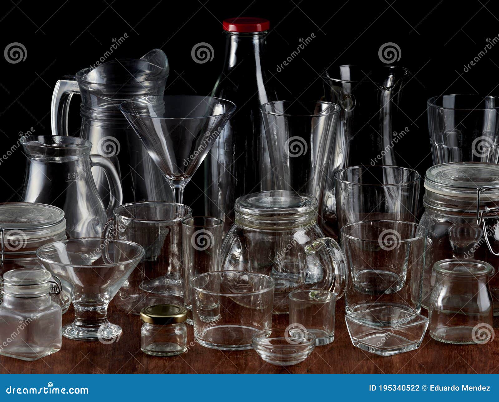 Empty glass containers stock photo. Image of beverage - 195340522