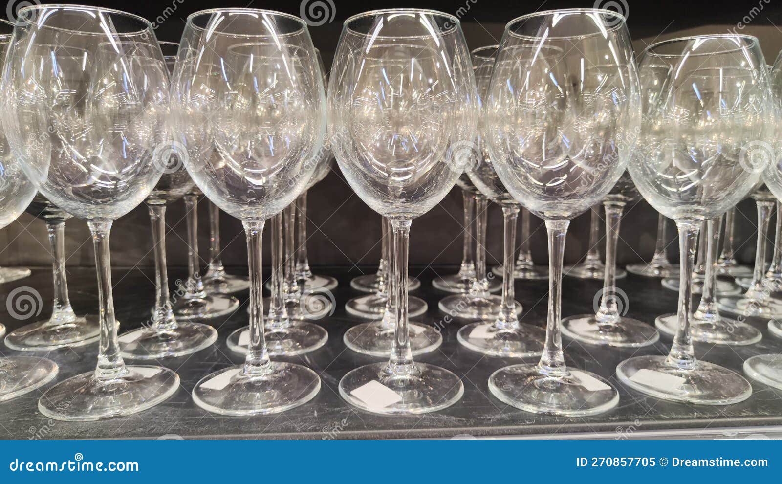 Empty Glass Glasses in Even Rows on the Shelf. Glassware As Background ...