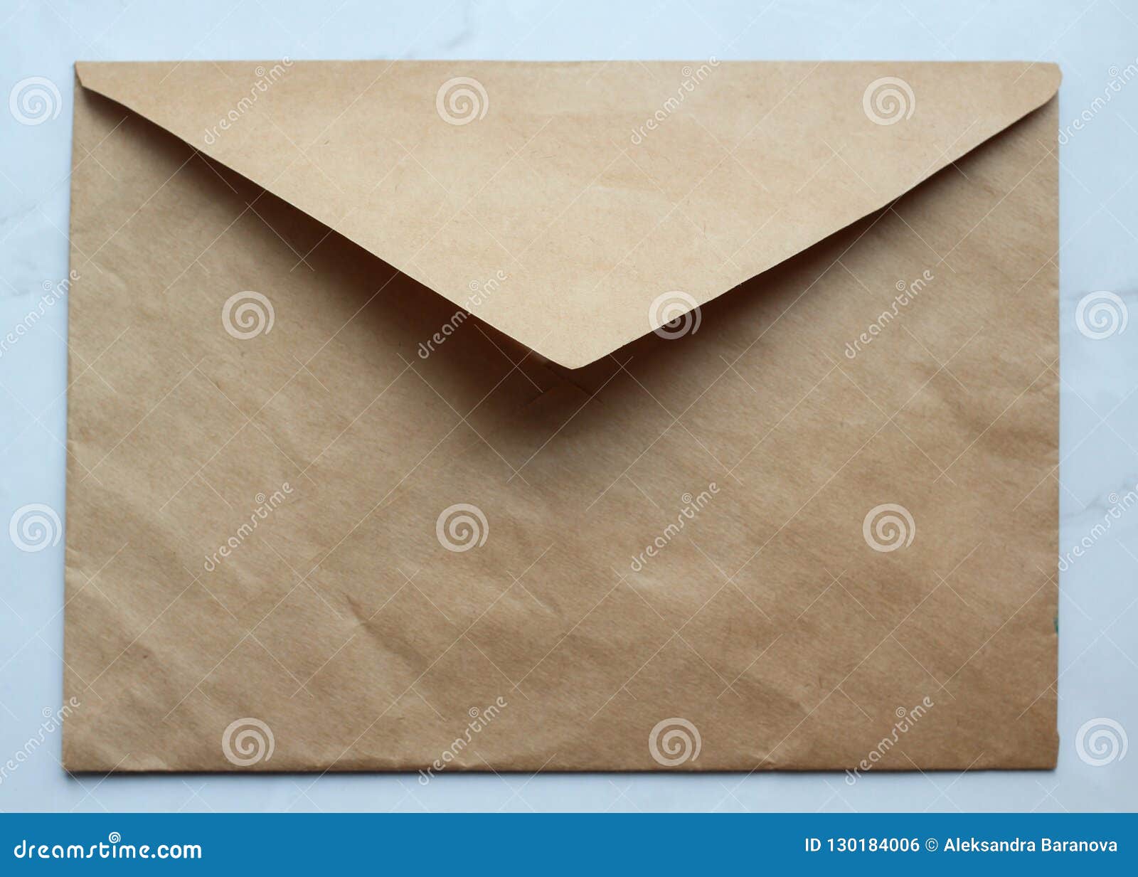 An Empty Golden Envelope on the Table, Kraft Paper, Copy Space Stock ...
