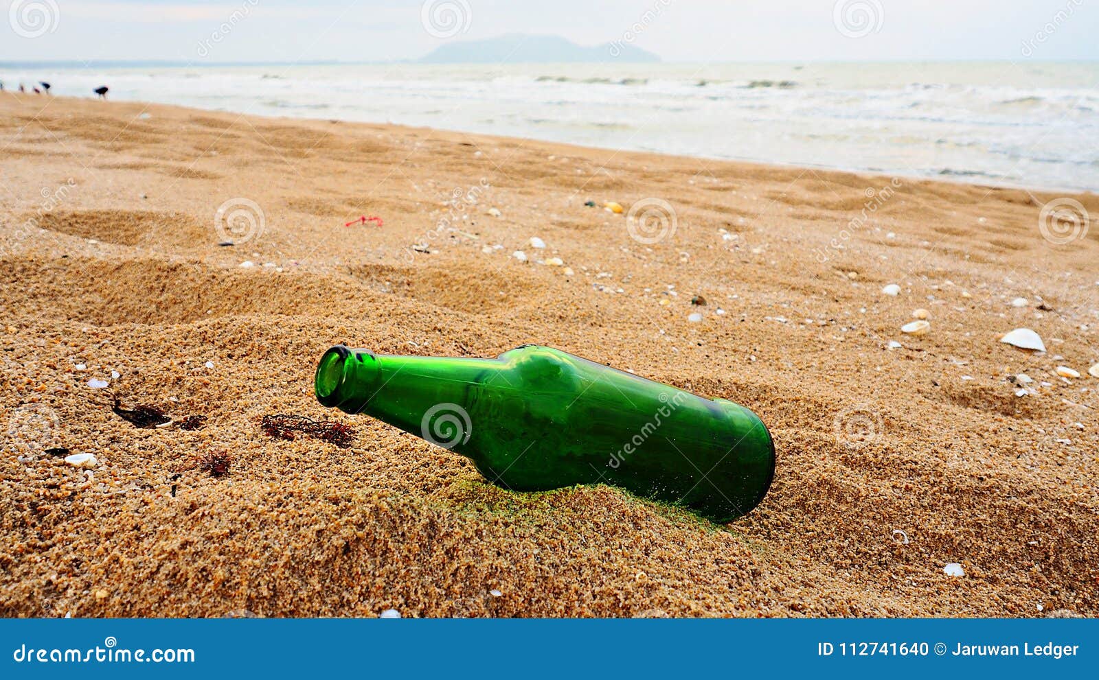 Empty Green Beer Bottle on the Beach. Stock Photo - Image of ...