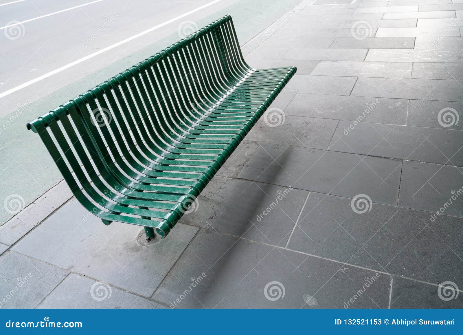 Empty Green Iron Bench on a Roadside, Footpath Stock Image - Image of ...