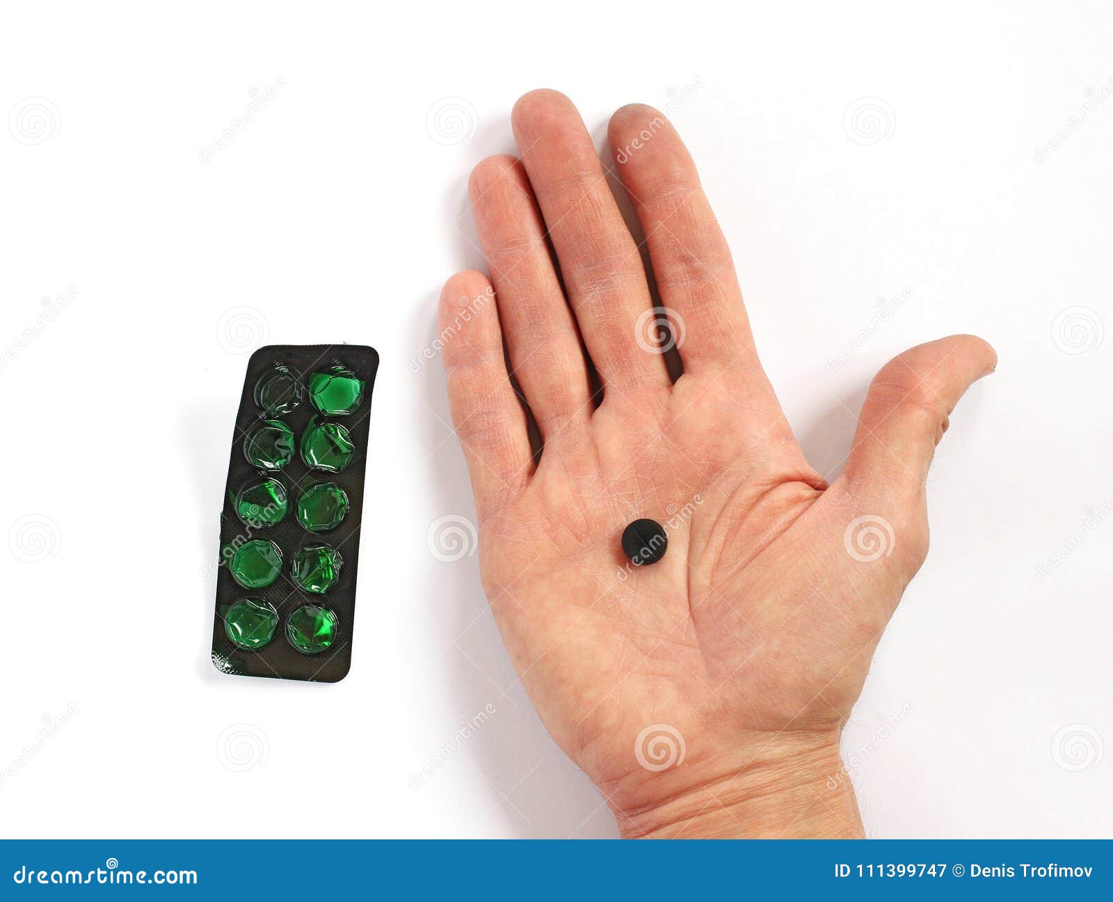 Empty Green Pill Box and Human Palm with Black Pill, Closeup Stock ...