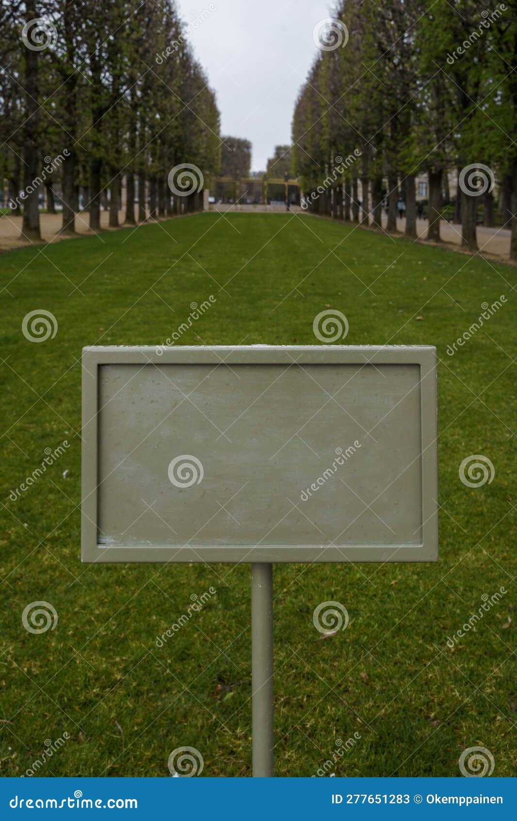 Empty Green Sign in Front of a Grass Field in Park Stock Image - Image ...