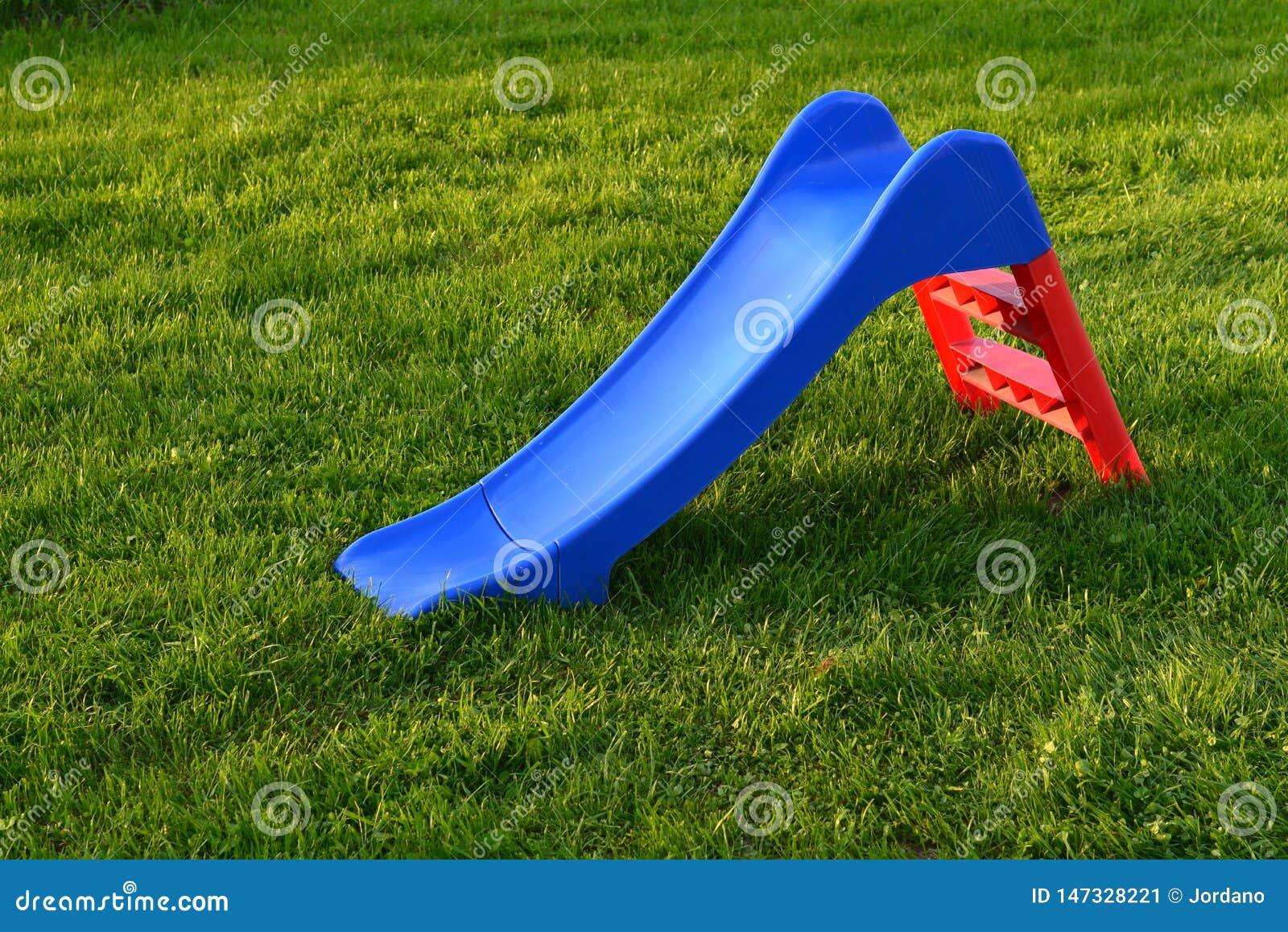Empty Green Slide on Grass in Park Stock Image - Image of game, garden ...