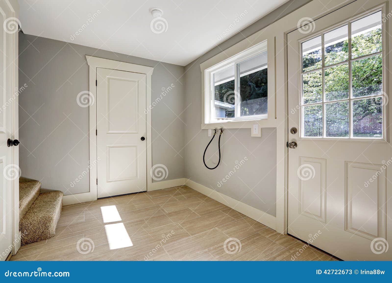 Empty Hallway with Tile Floor and Entrance Door Stock Image - Image of ...