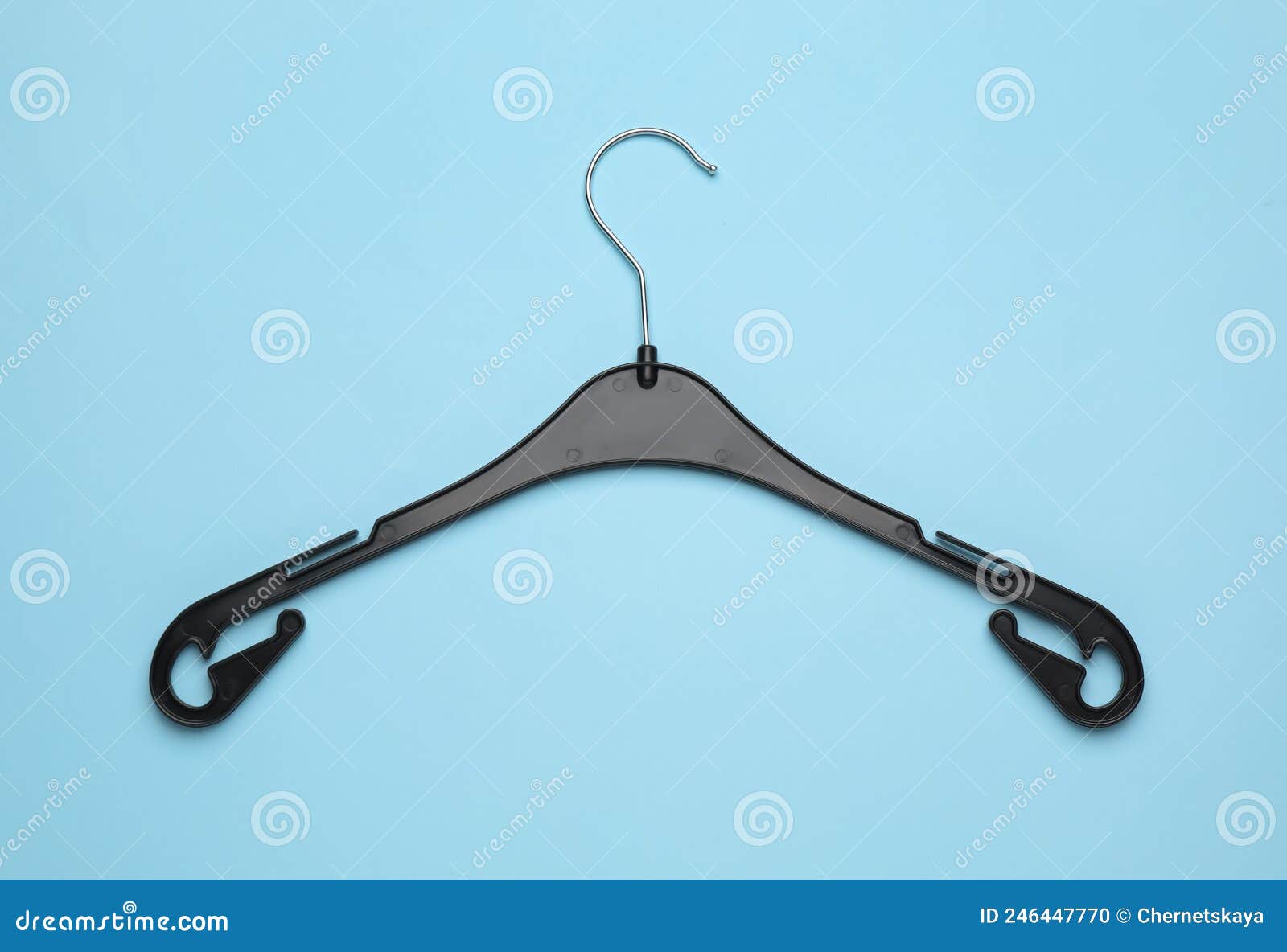 Empty Hanger on Light Blue Background, Top View Stock Photo - Image of ...