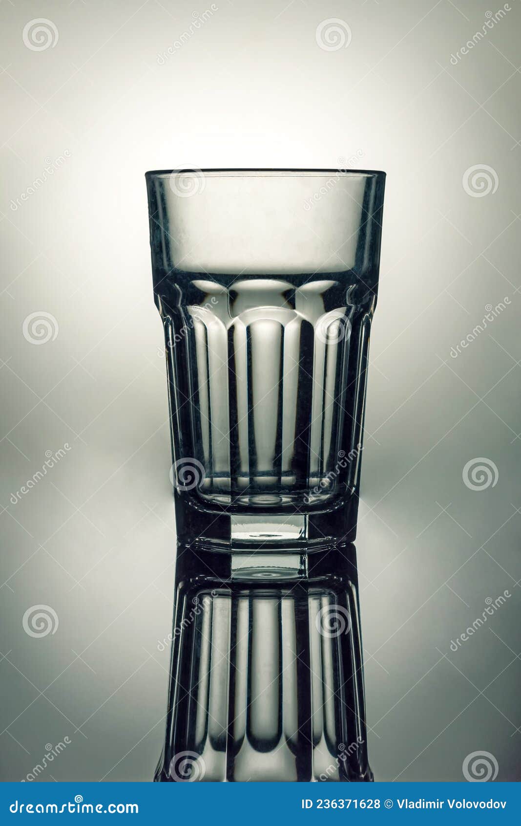 Empty Highball Glass on a Gray Background with a Beautiful Reflection ...
