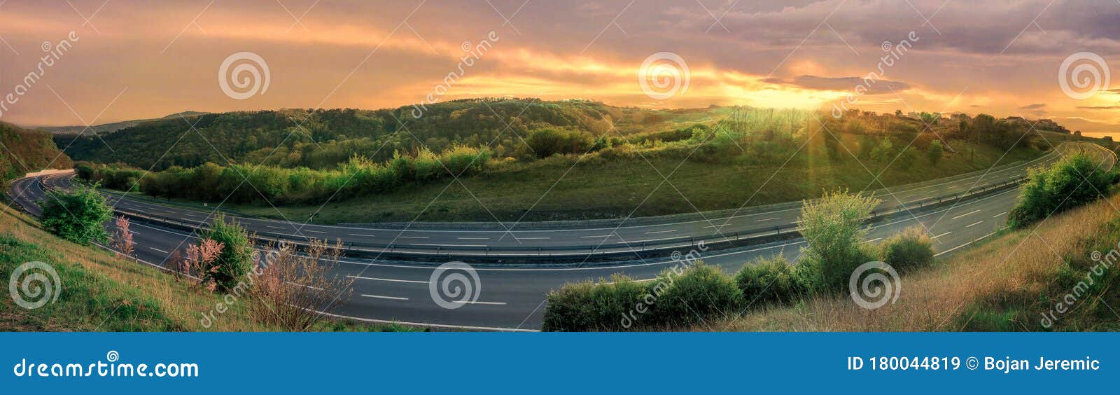 The Empty Highway Goes Uphill with a Beautiful Sunset. Stock Image ...