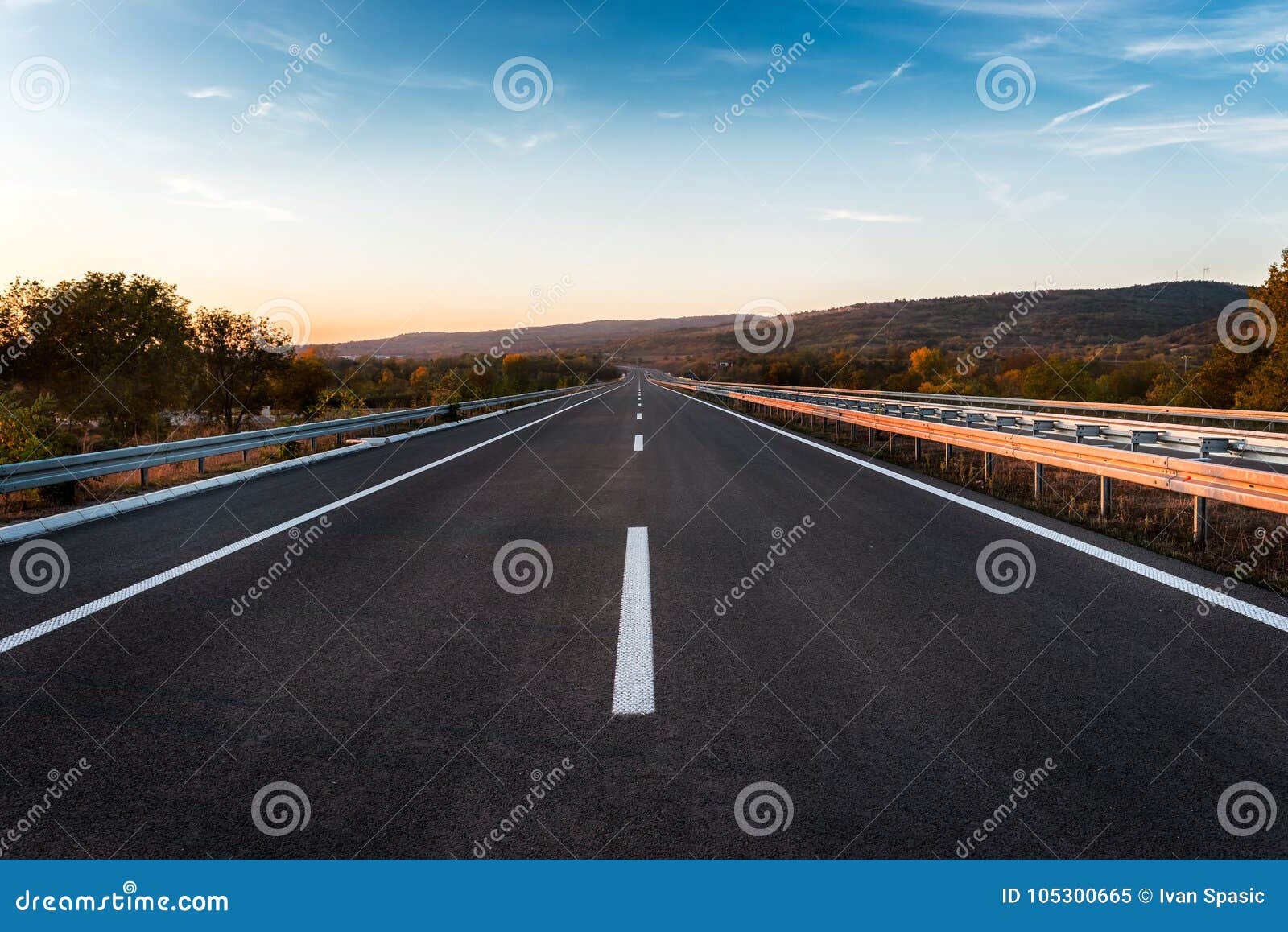 Empty highway at sunset stock image. Image of nature - 105300665