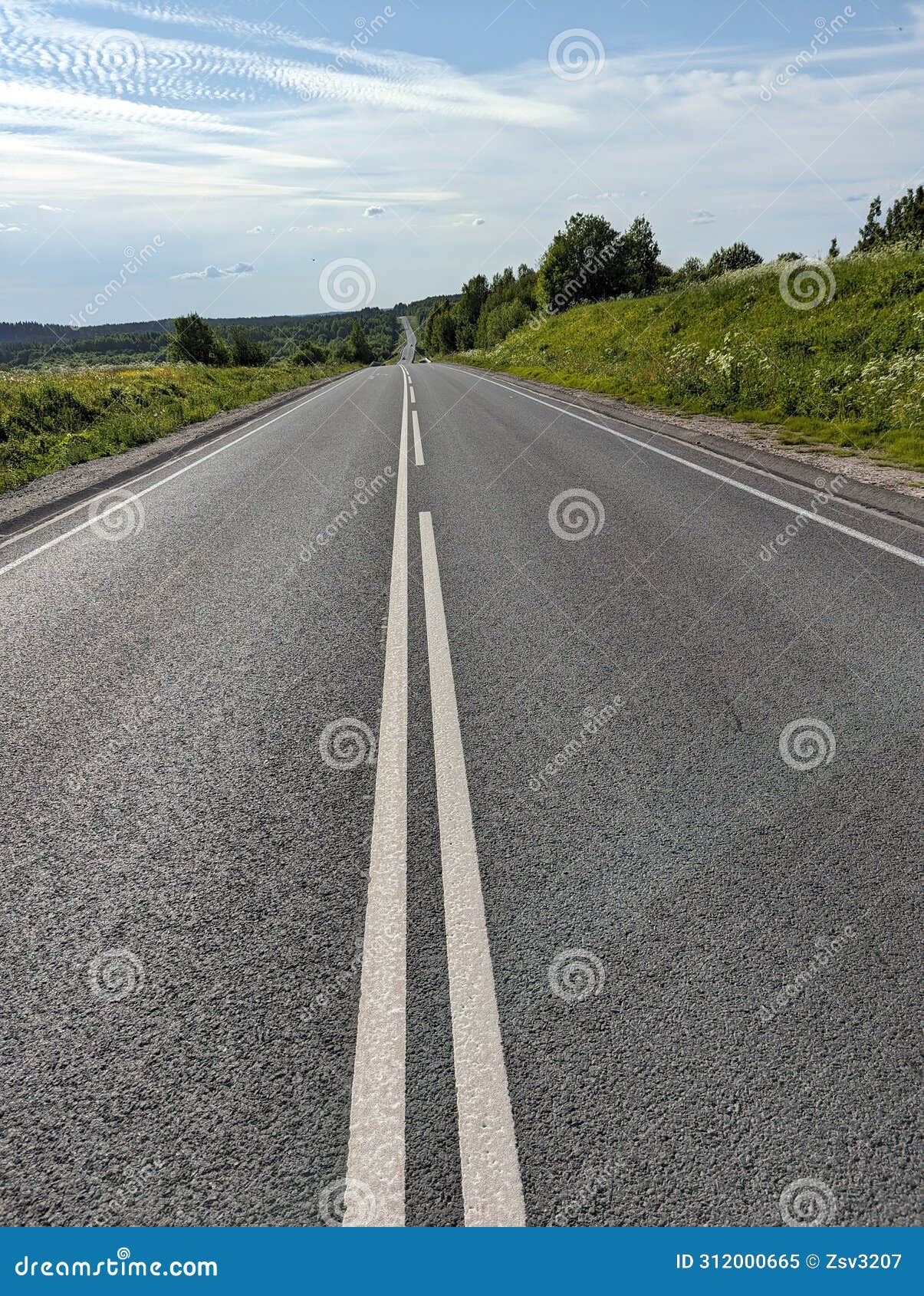 An Empty Highway Under the Sky, Lined with White Parallel Stripes Stock ...