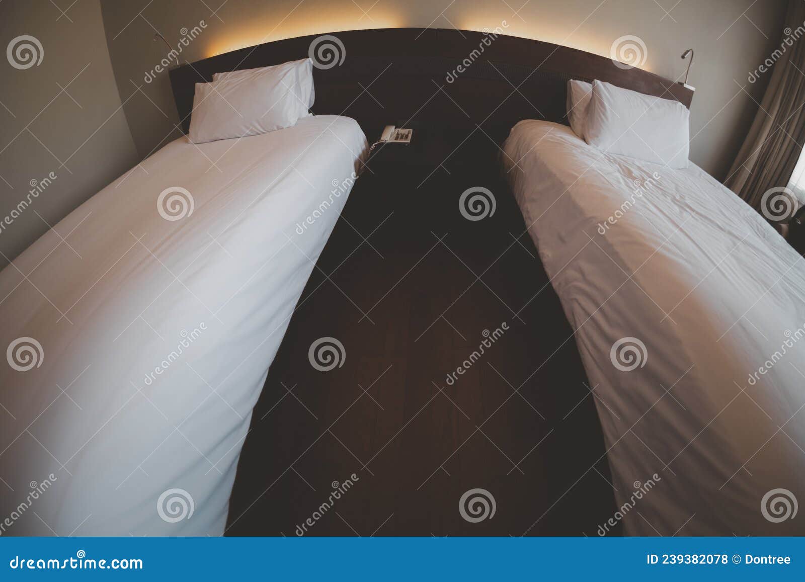 An Empty Hotel or Motel Room with Two Beds Stock Photo - Image of ...