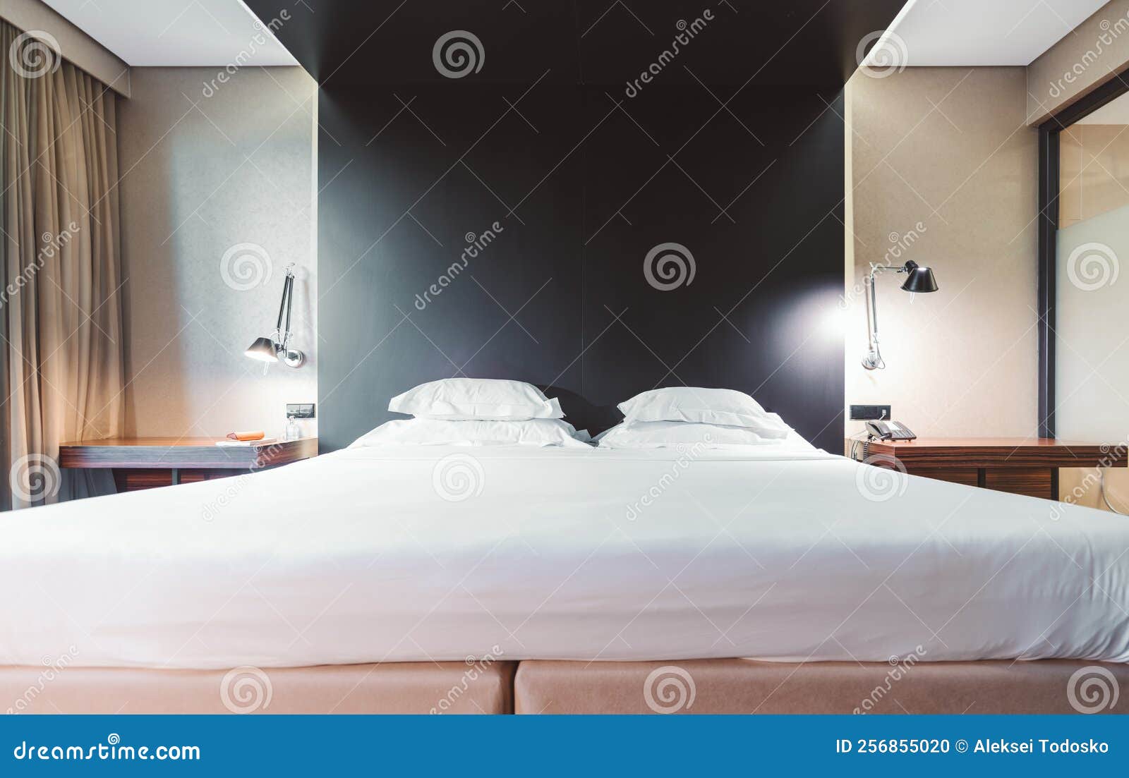 An Empty Hotel Room with a Made Bed Stock Photo - Image of luxury ...