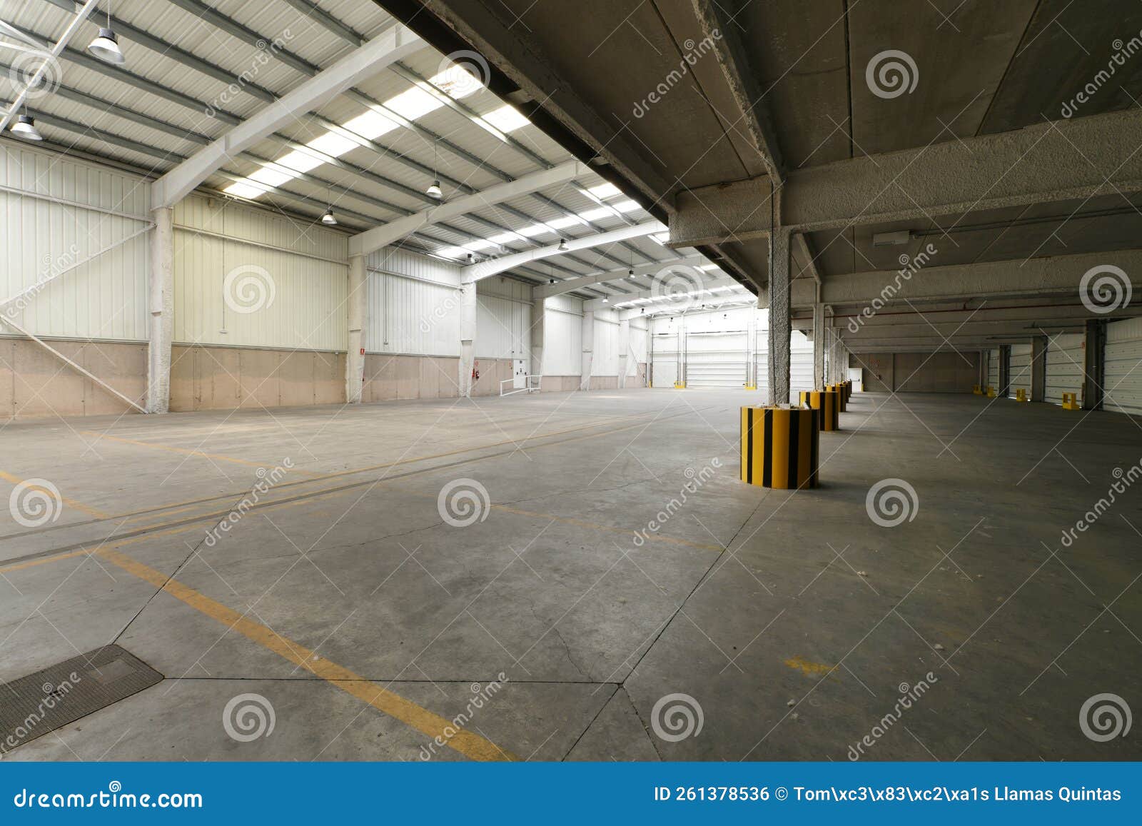 Empty Industrial Warehouse with Corrugated Iron Roofs with Skylights ...