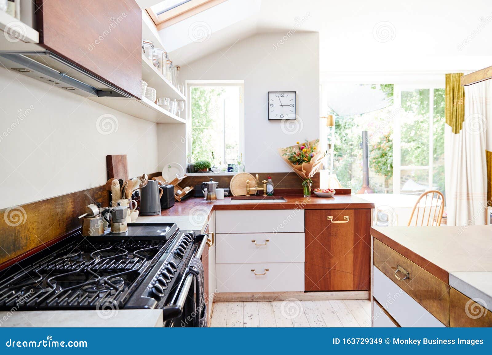 Empty Interior of Contemporary Kitchen with Cooker and Storage Stock ...