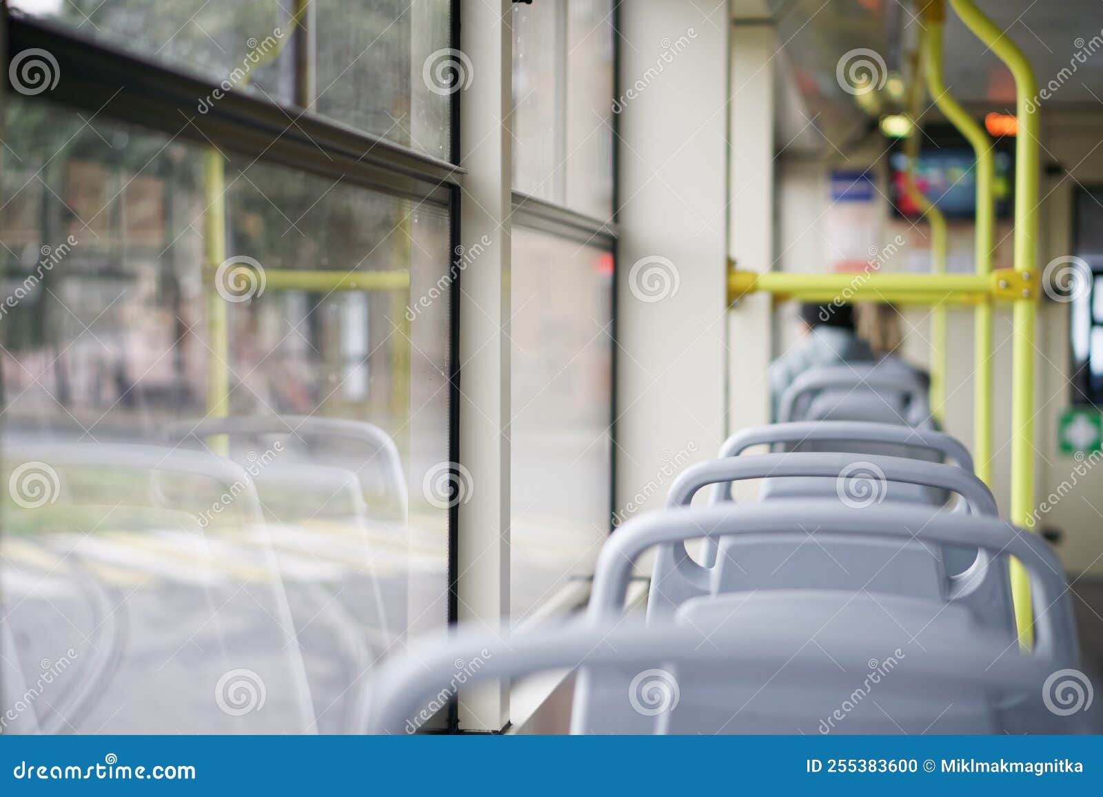 Empty Interior of a Tram, Trolleybus or Bus Traveling through the City ...