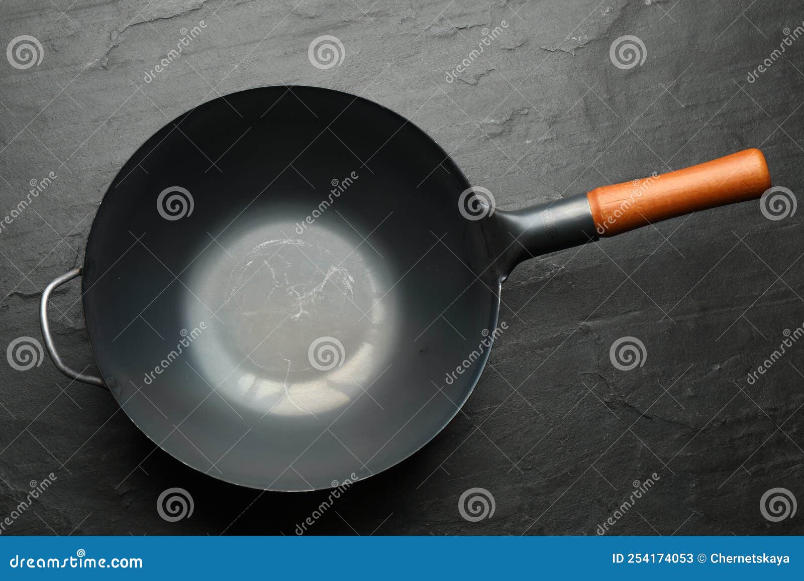 Empty Iron Wok on Black Slate Table, Top View. Chinese Cookware Stock ...