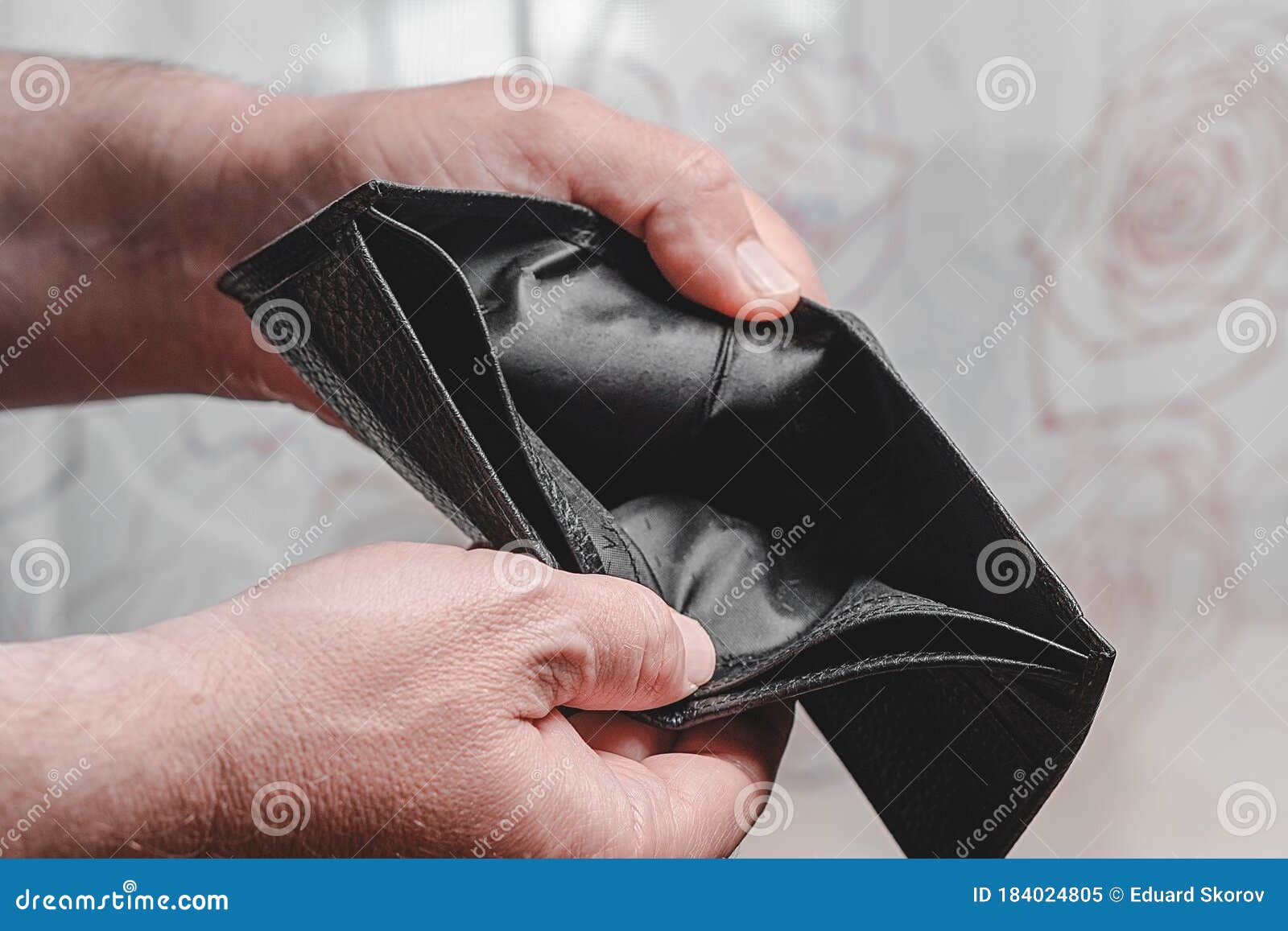 Empty Leather Wallet in the Hands of a Man, Close-up. Poverty Concept ...