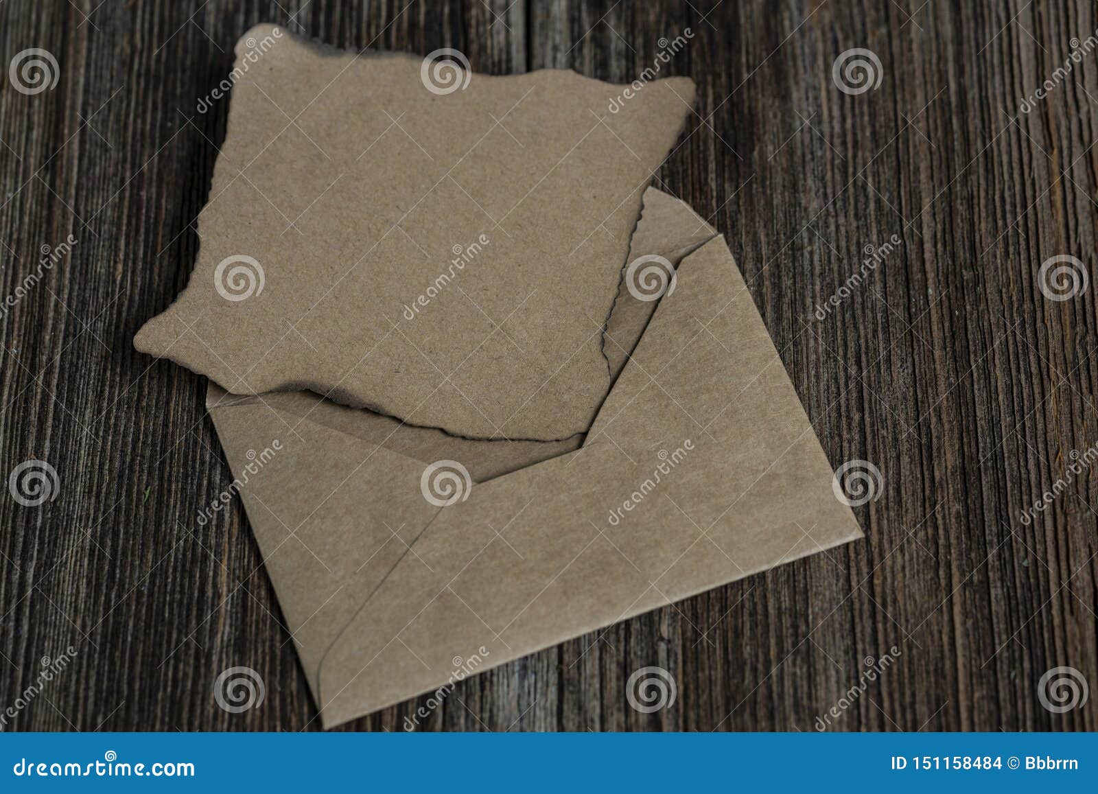 An Empty Letter and Envelop on a Wooden Table with Copy Space Stock ...