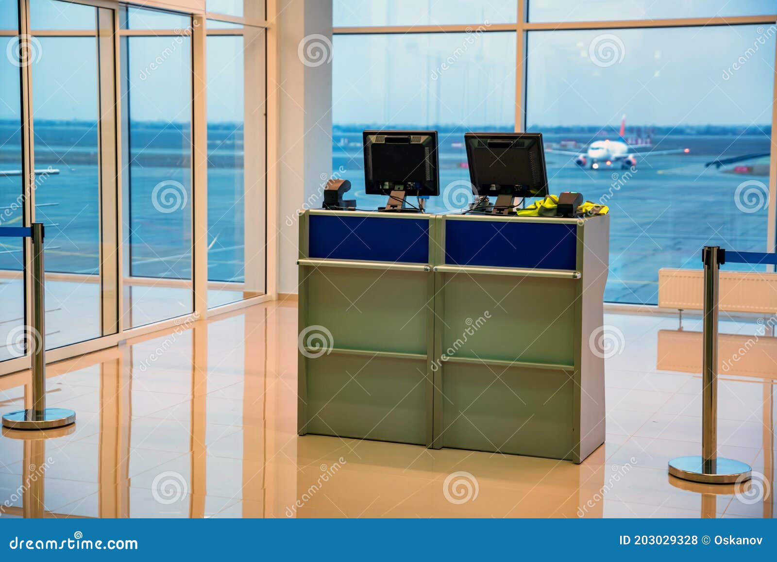 Empty Little Check-in Desks with Computers in Airport Stock Photo ...