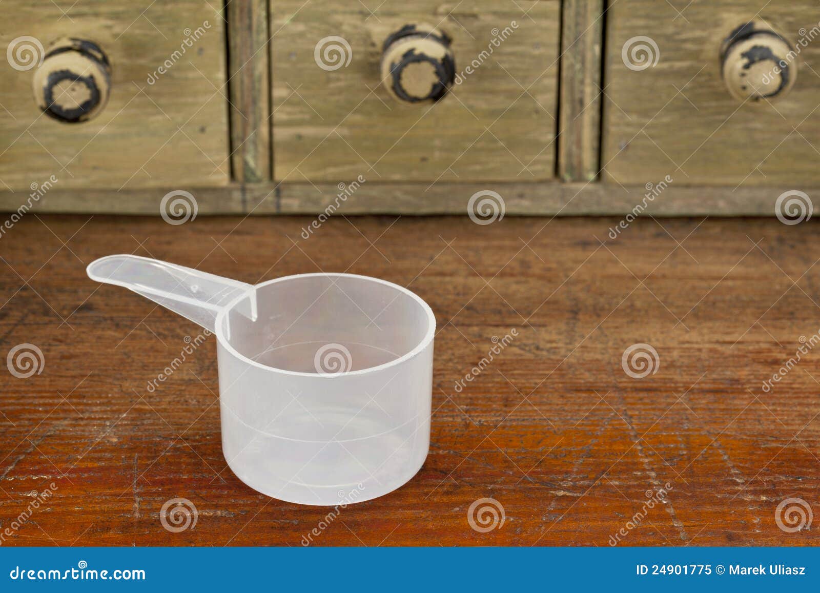 Empty measuring cup stock image. Image of scratched, wood - 24901775