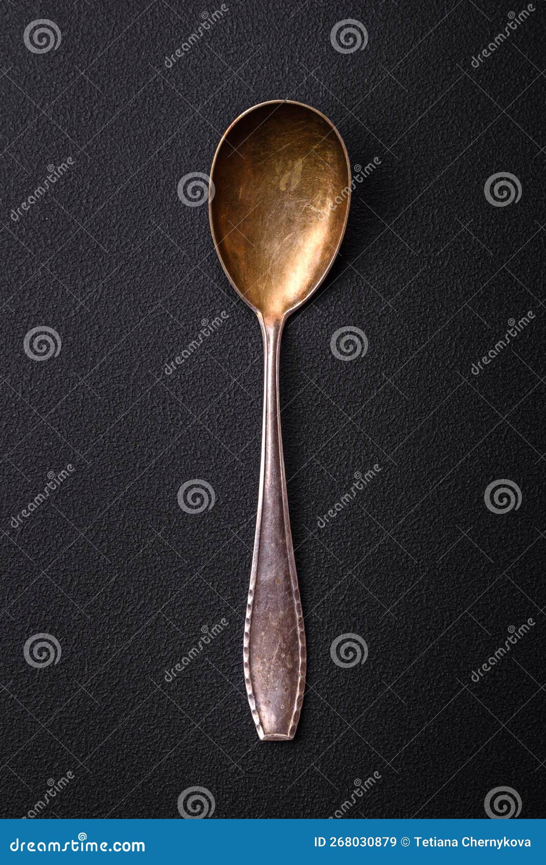 Empty Metal Spoon on Dark Textured Concrete Background Stock Image ...