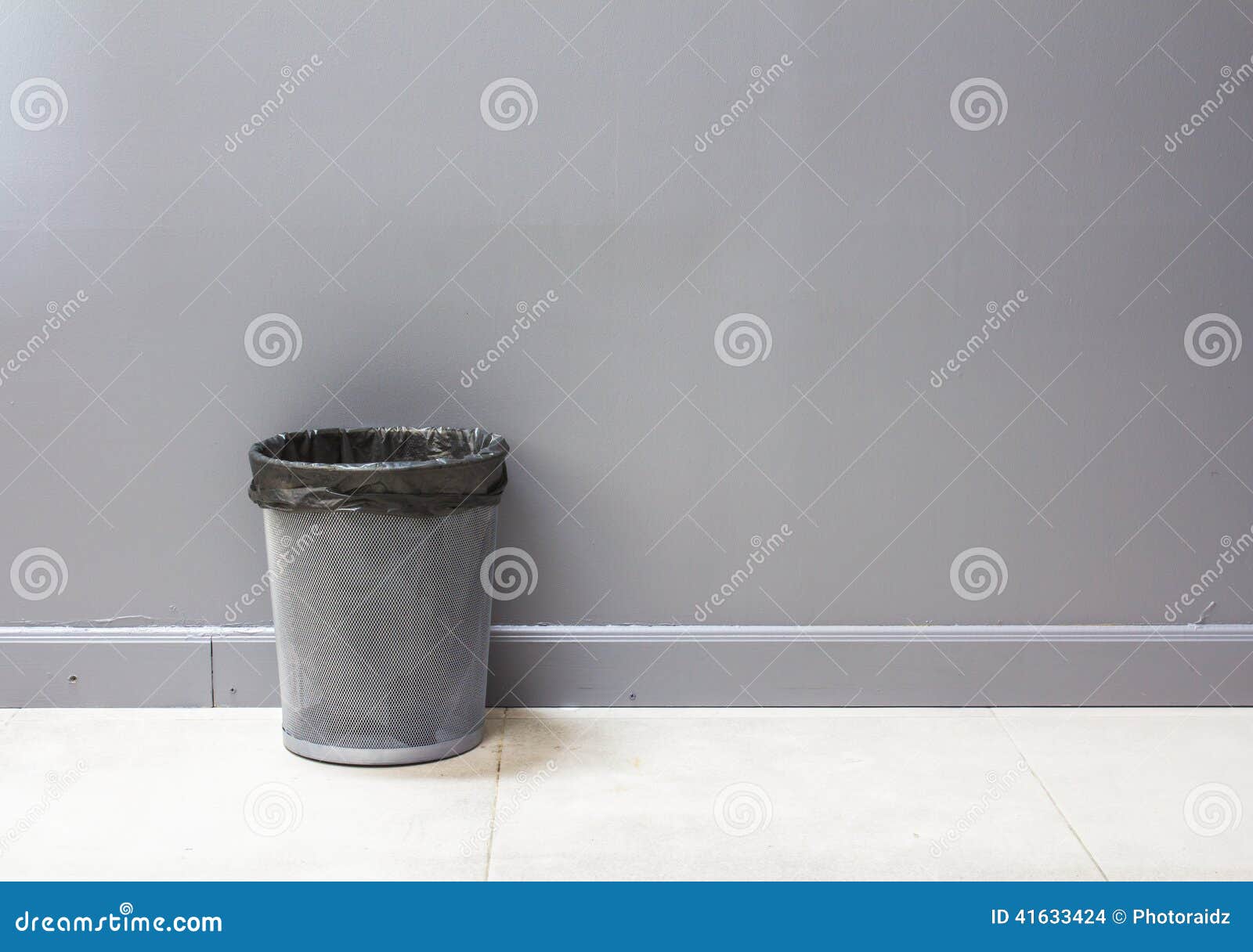 An Empty Metal Trashcan (bin) Isolated on Gray Stock Photo - Image of ...