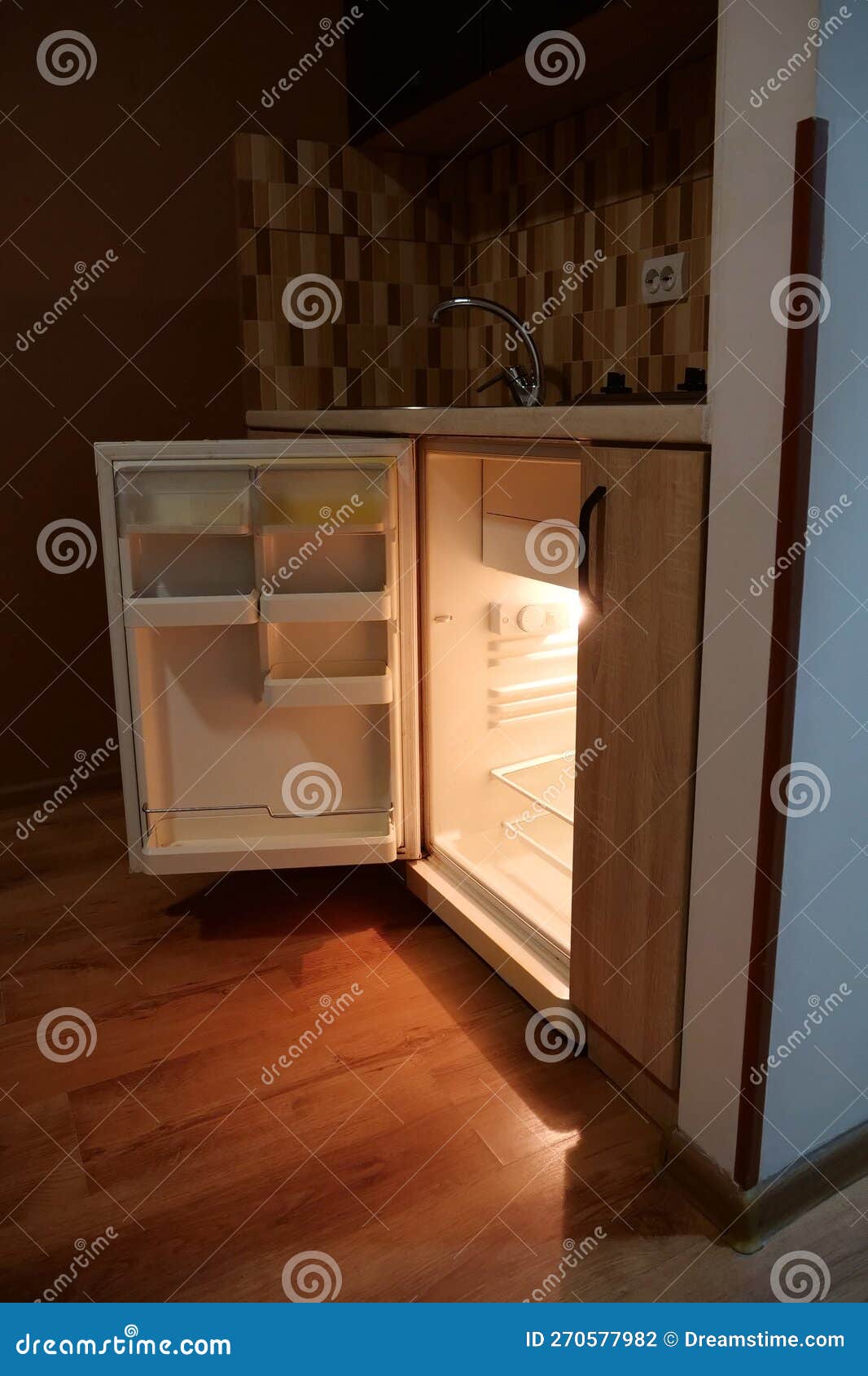 Empty Mini Fridge with Open Door in Kitchen Stock Photo - Image of ...