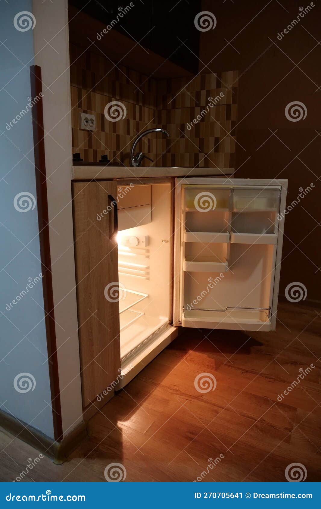 Empty Mini Fridge with Open Door in Kitchen Stock Image - Image of ...
