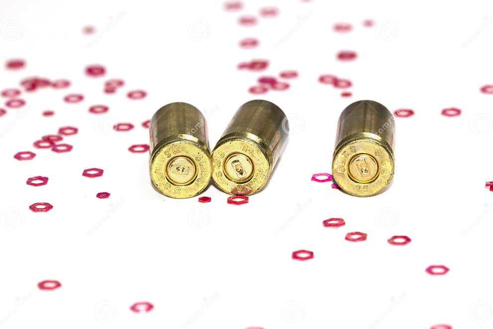 Empty 9mm Bullet Shells Over White Background with Red Hexagon Small ...