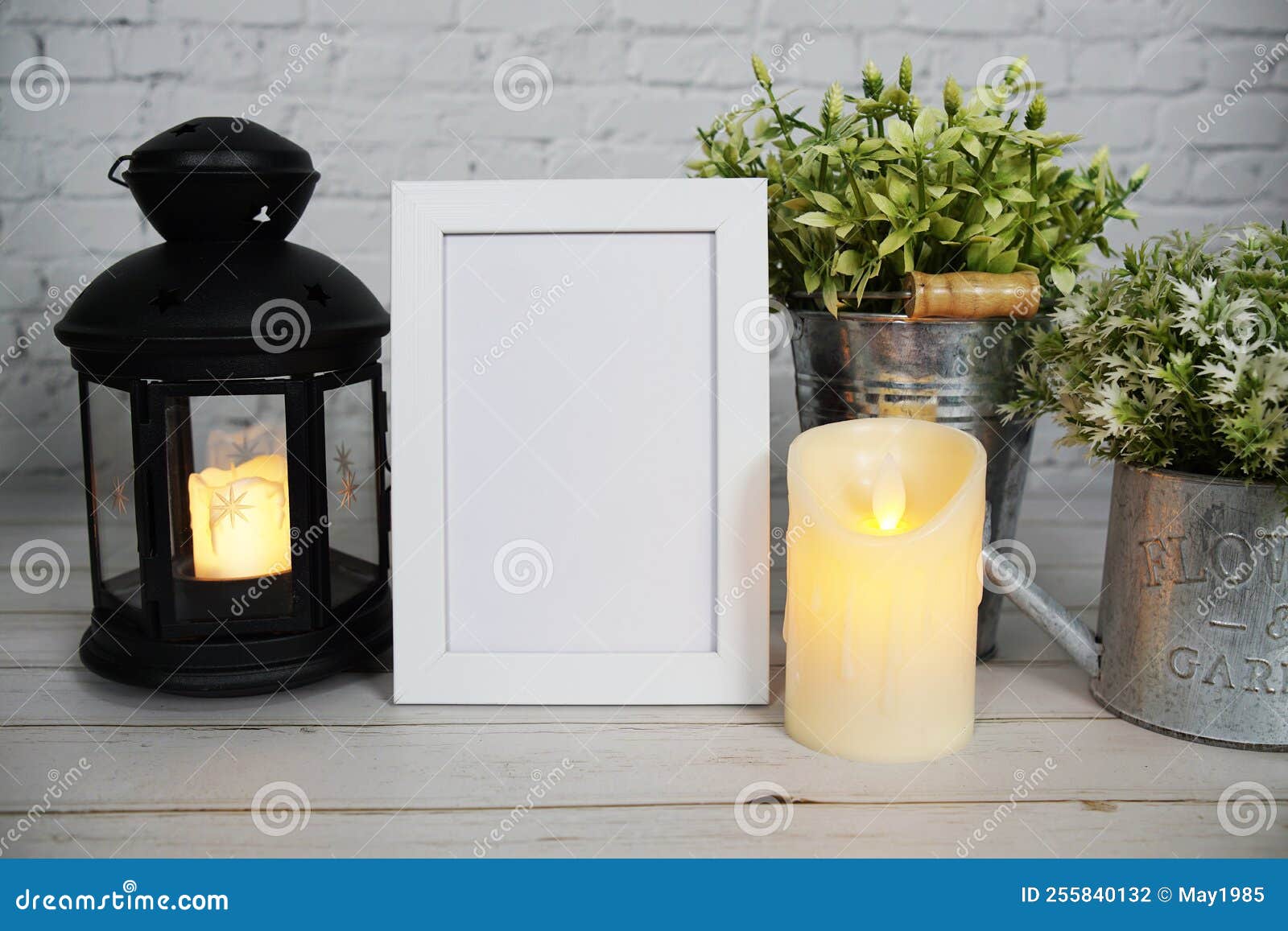 Empty Mockup Photo Frame with LED Candlelight on White Brick Wall ...