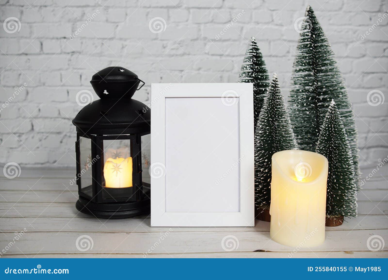 Empty Mockup Photo Frame with LED Candlelight on White Brick Wall ...